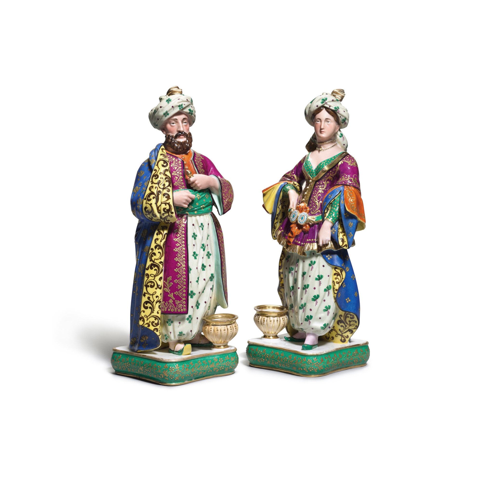A pair of porcelain flasks and stoppers in the form of a standing ...