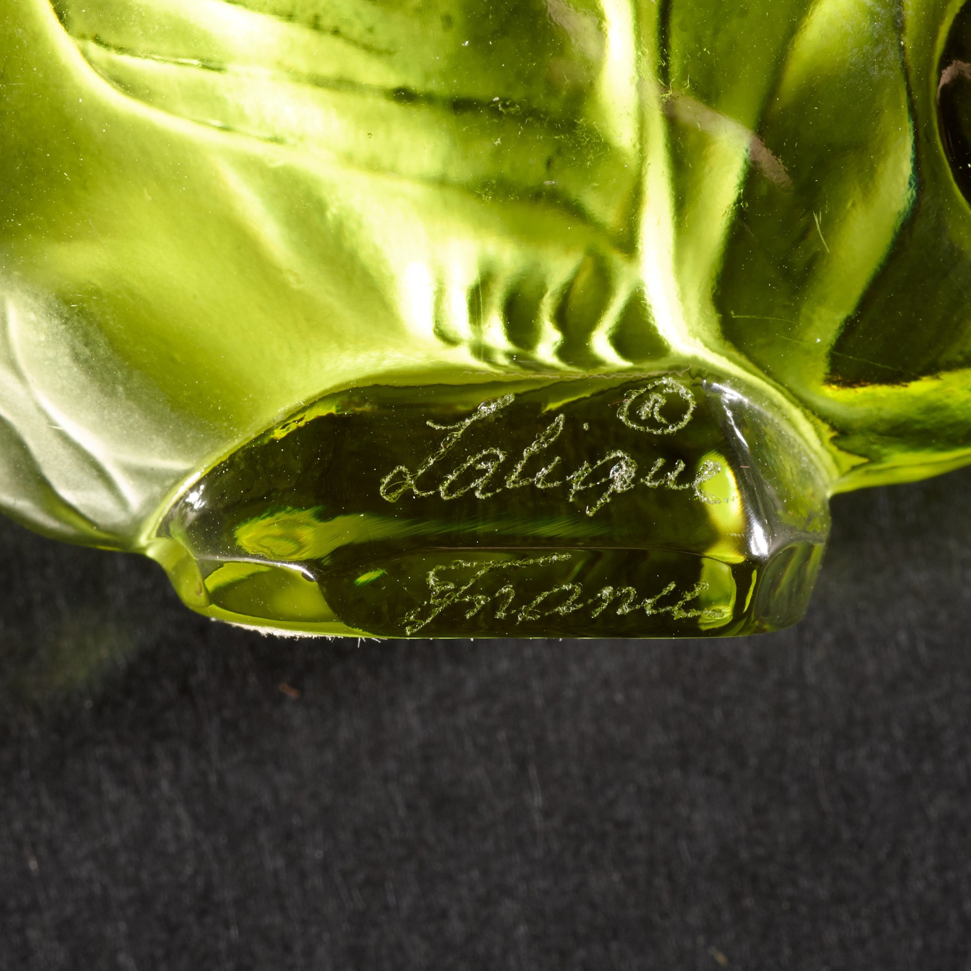 A Lalique model of a squirrel and eight models of tropical fish, modern ...