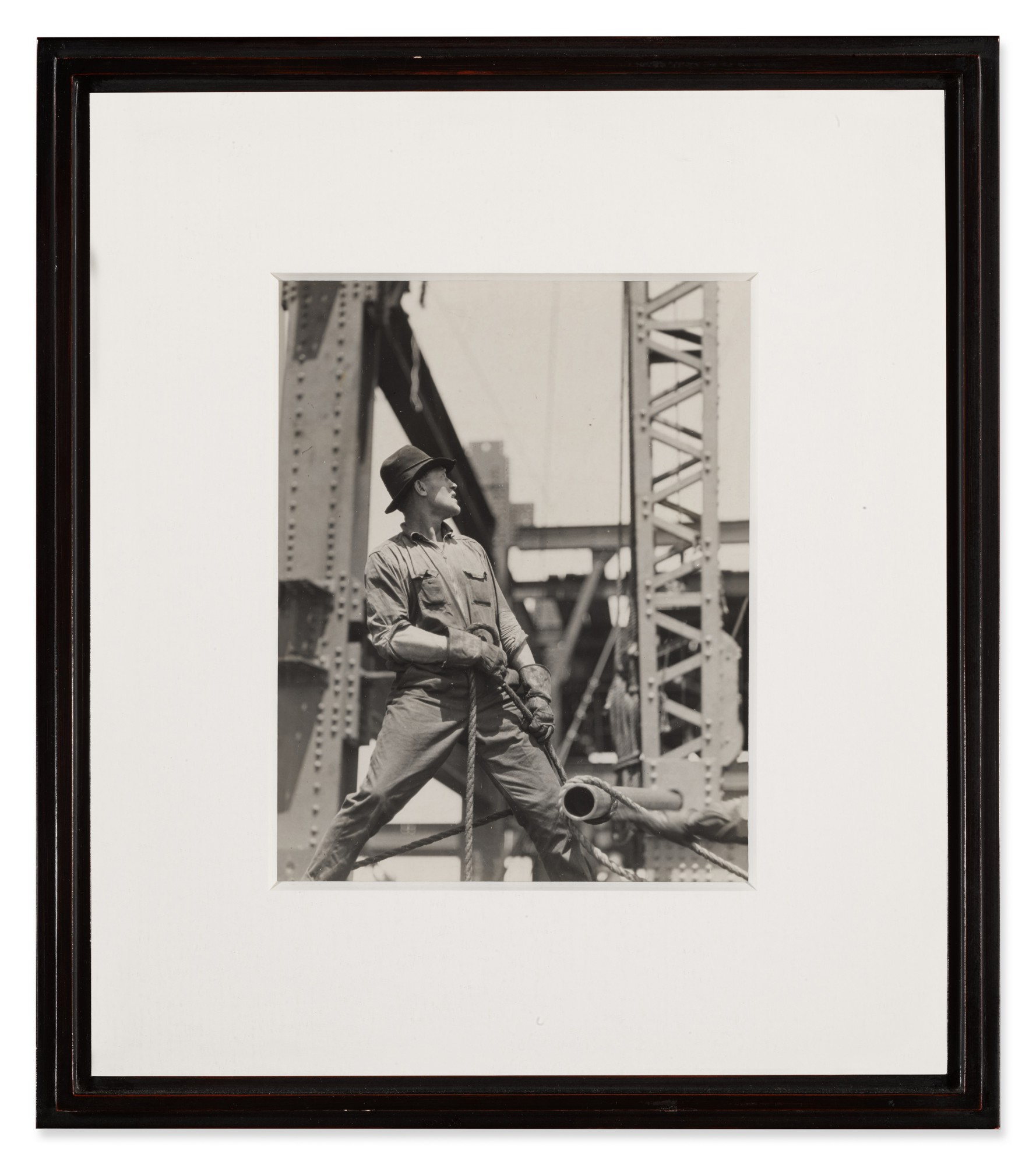 'Derrick-man who directs and controls the derrick with its great loads ...