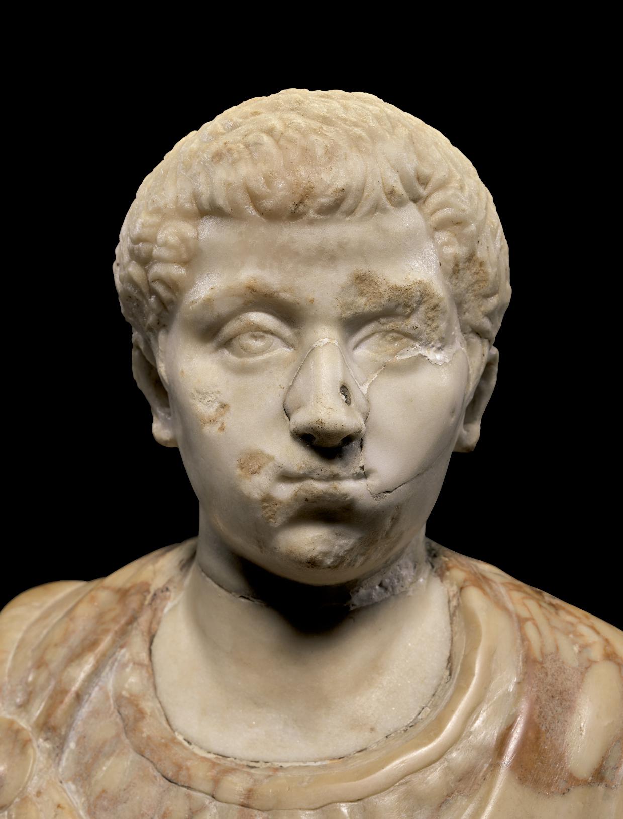 A ROMAN MARBLE PORTRAIT HEAD OF A YOUTH, SEVERAN, MID 3RD CENTURY A.D ...