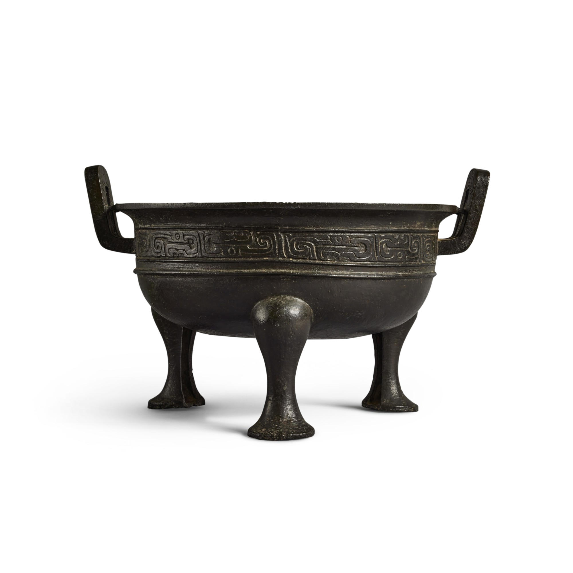A rare inscribed archaic bronze ritual food vessel (Ding), Late Western ...