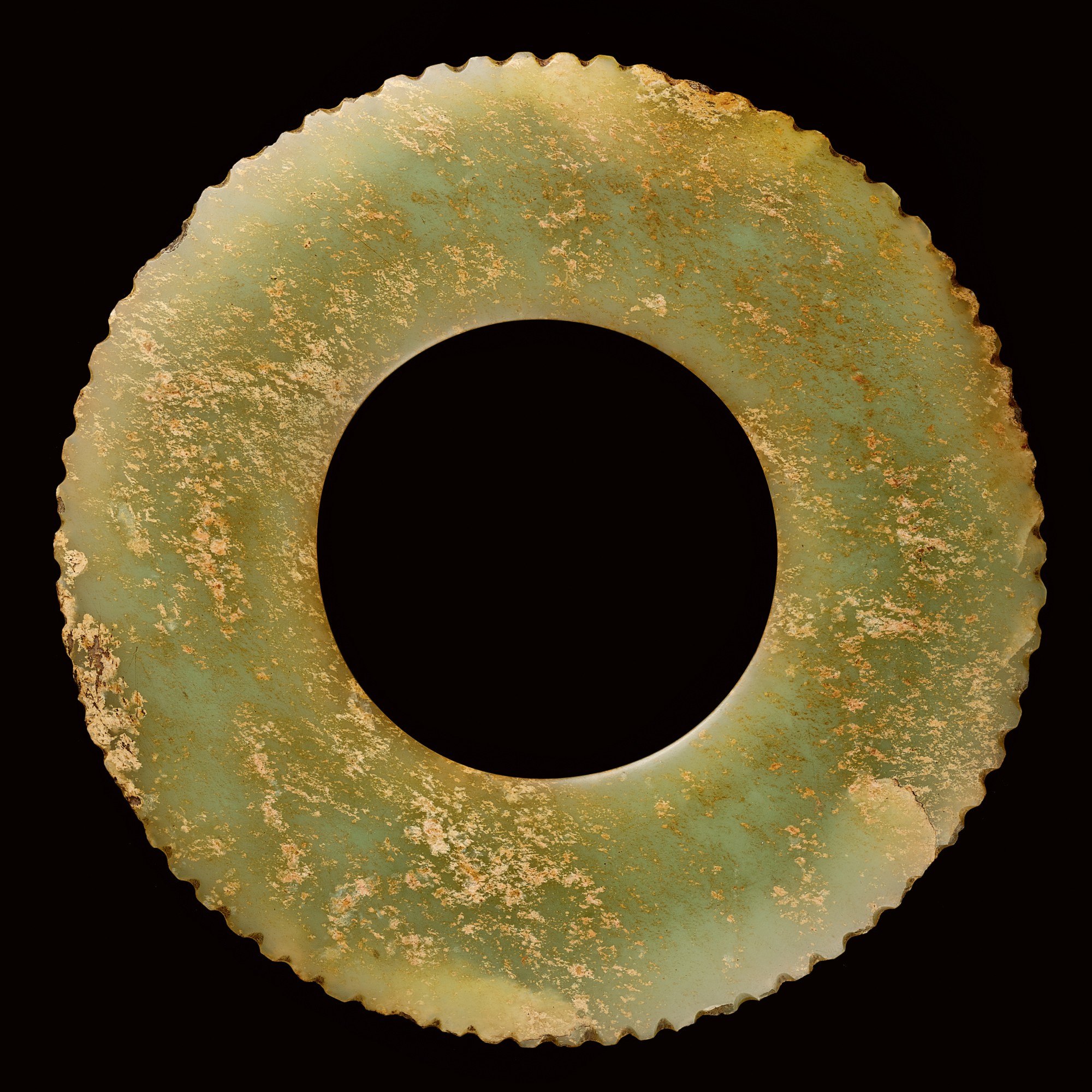 A GREEN JADE NOTCHED DISC, BI NEOLITHIC PERIOD, JIANG-HUAI REGION ...