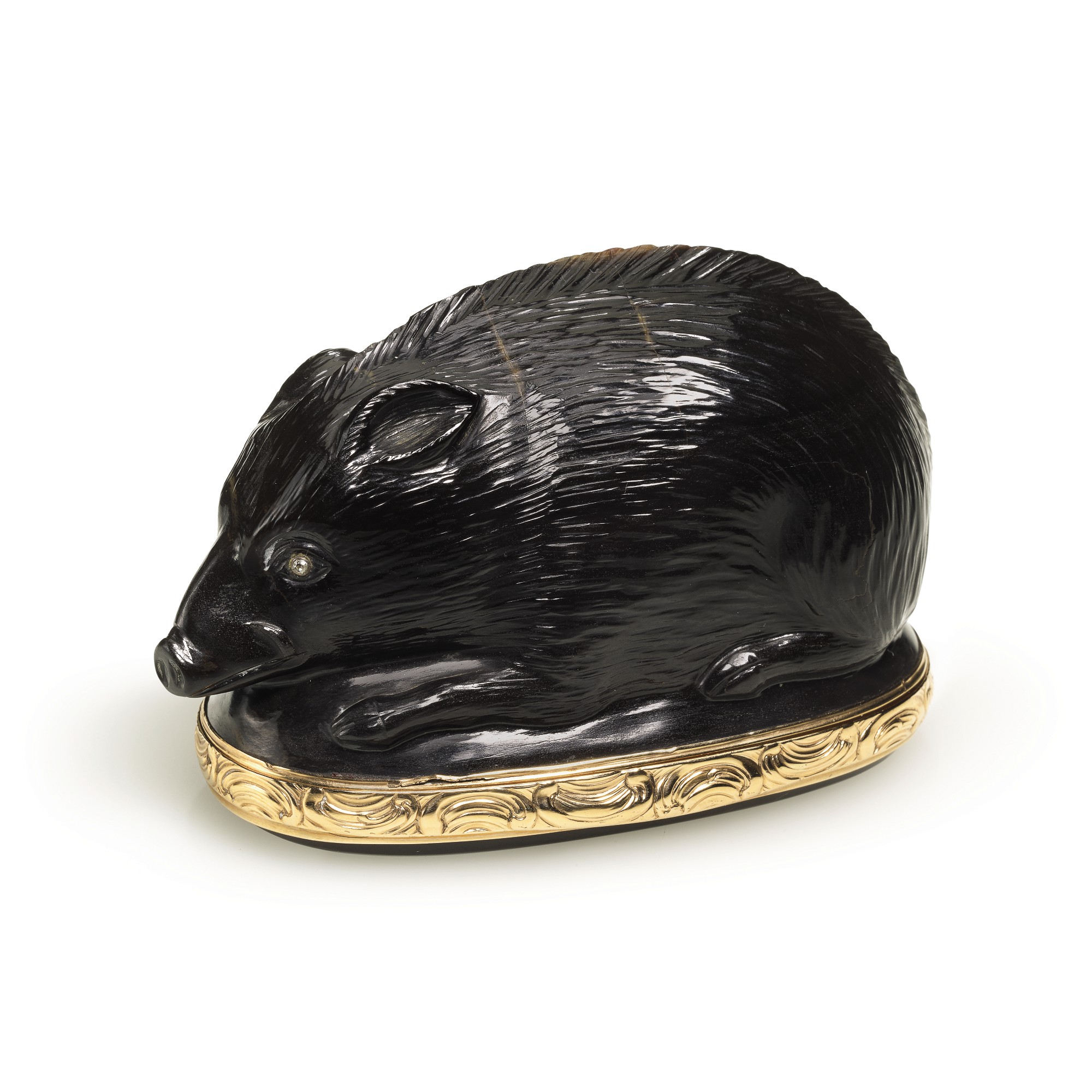 A gold-mounted black jasper snuff box in the shape of a boar, probably ...
