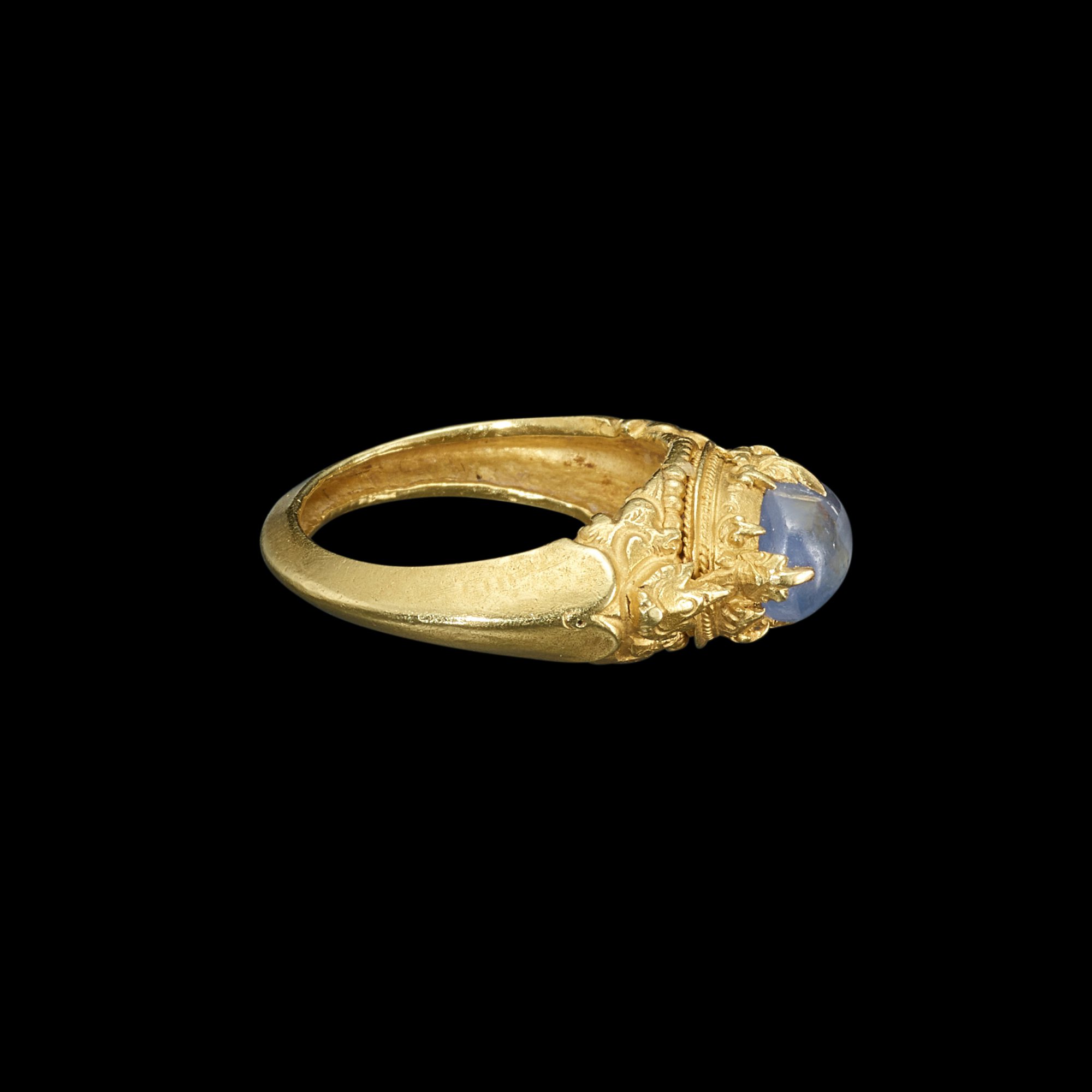 A solid gold and sapphire ring Central Java, Indonesia, 9th - 11th ...