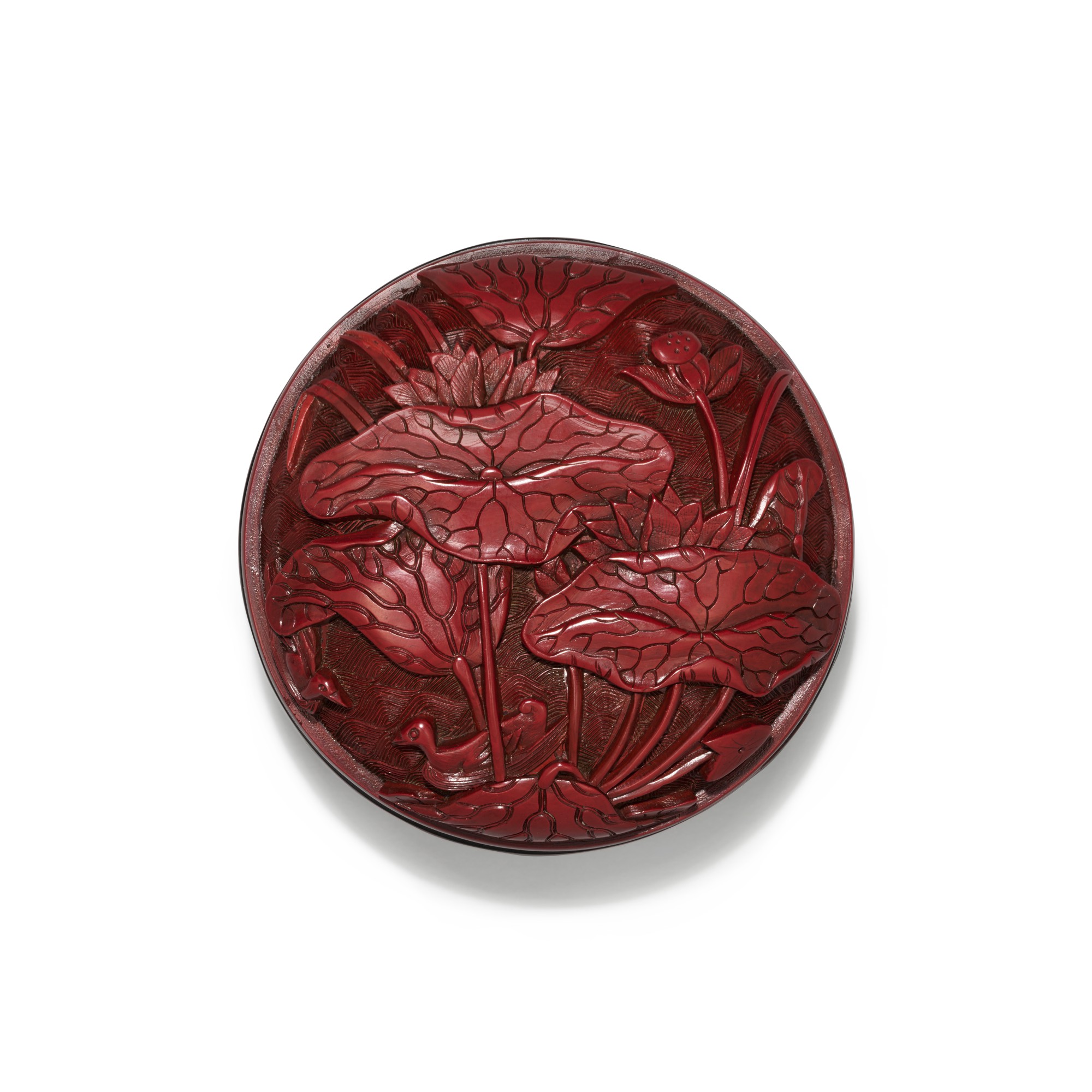 A carved cinnabar lacquer 'lotus' box and cover, Ming dynasty, 16th ...