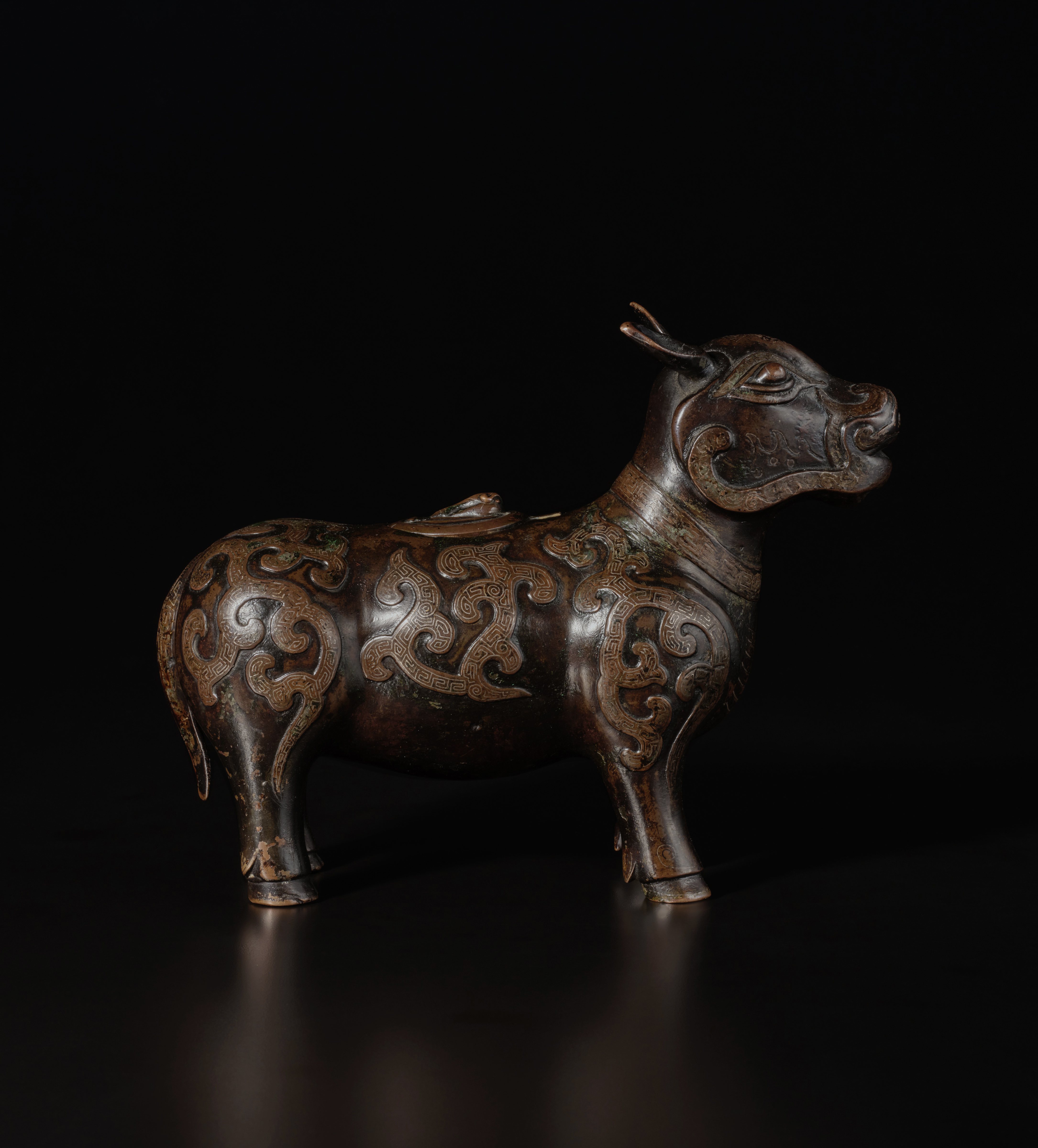 An archaistic silver-inlaid bronze figure of a tapir, Ming dynasty | 明 ...