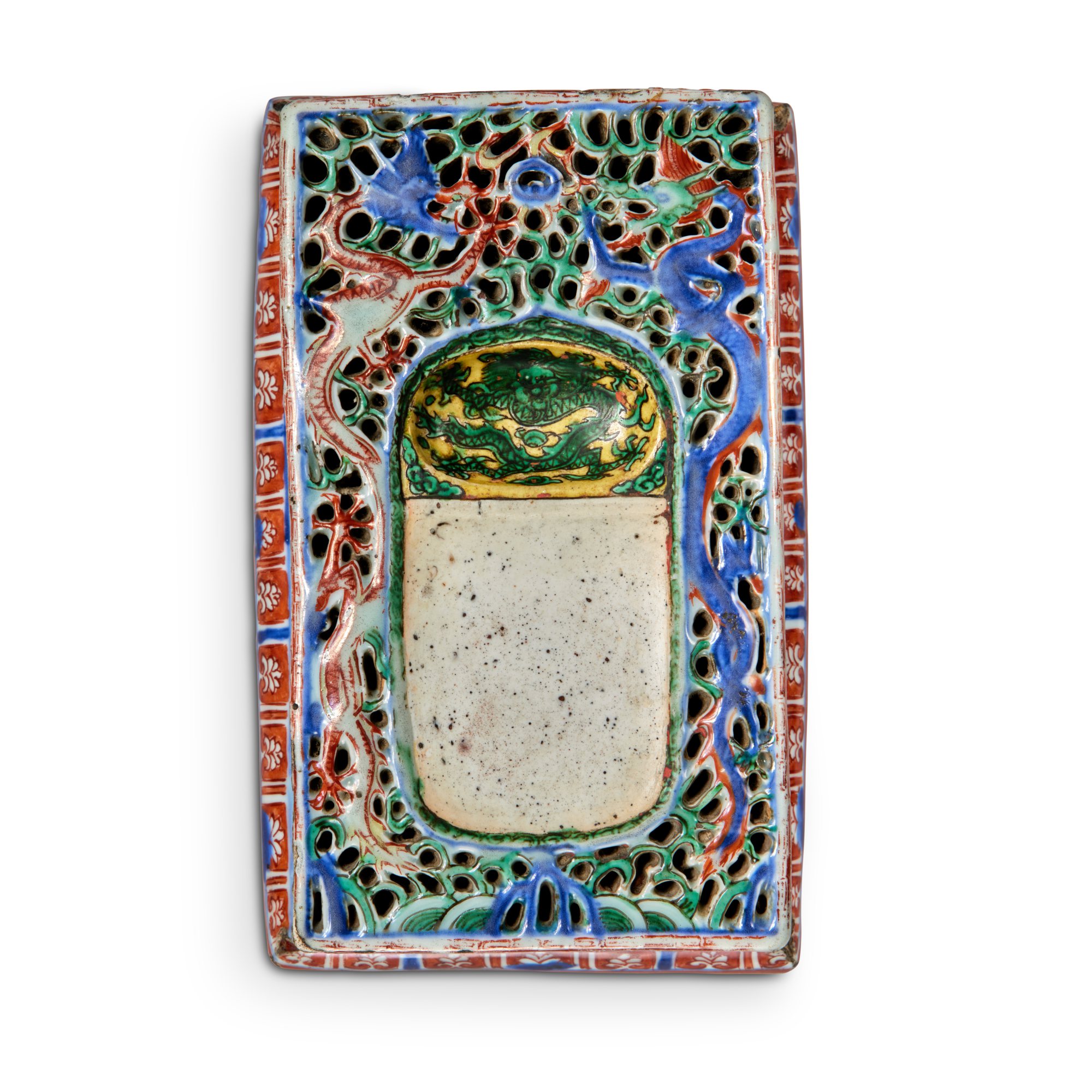 A rare wucai 'dragon' rectangular inkstone, Mark and period of Wanli ...