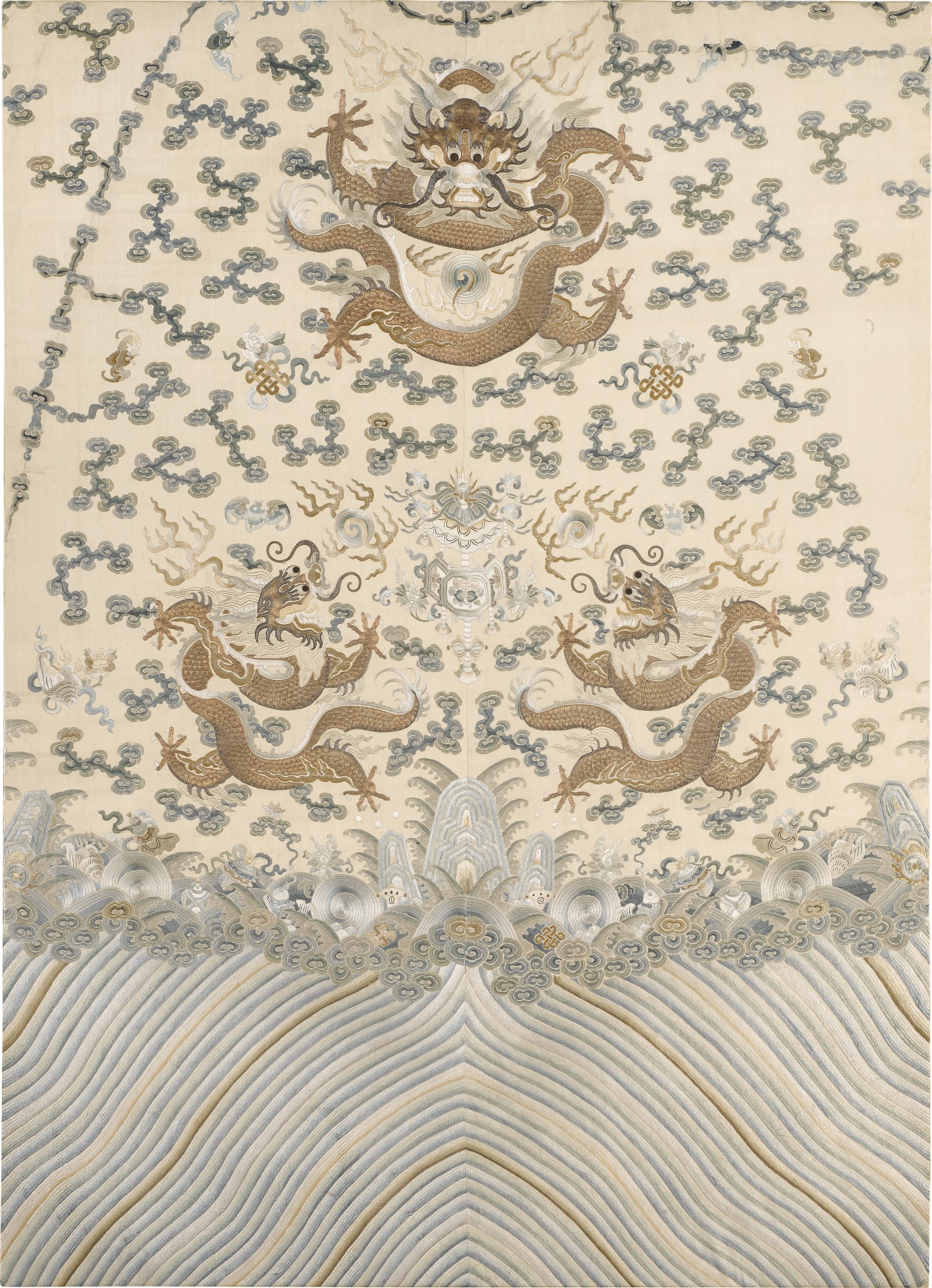 A PALE YELLOW-GROUND SILK EMBROIDERED 'DRAGON' PANEL FOR A ROBE, LATE ...