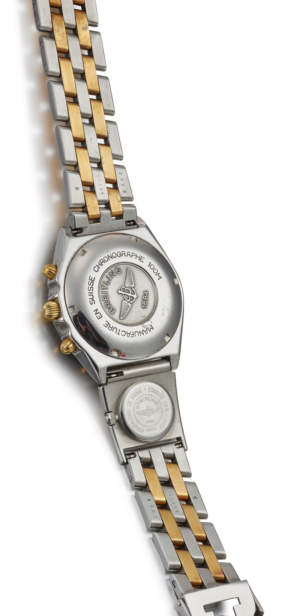 BREITLING | A STAINLESS STEEL AND YELLOW GOLD DUAL TIME ZONE ...