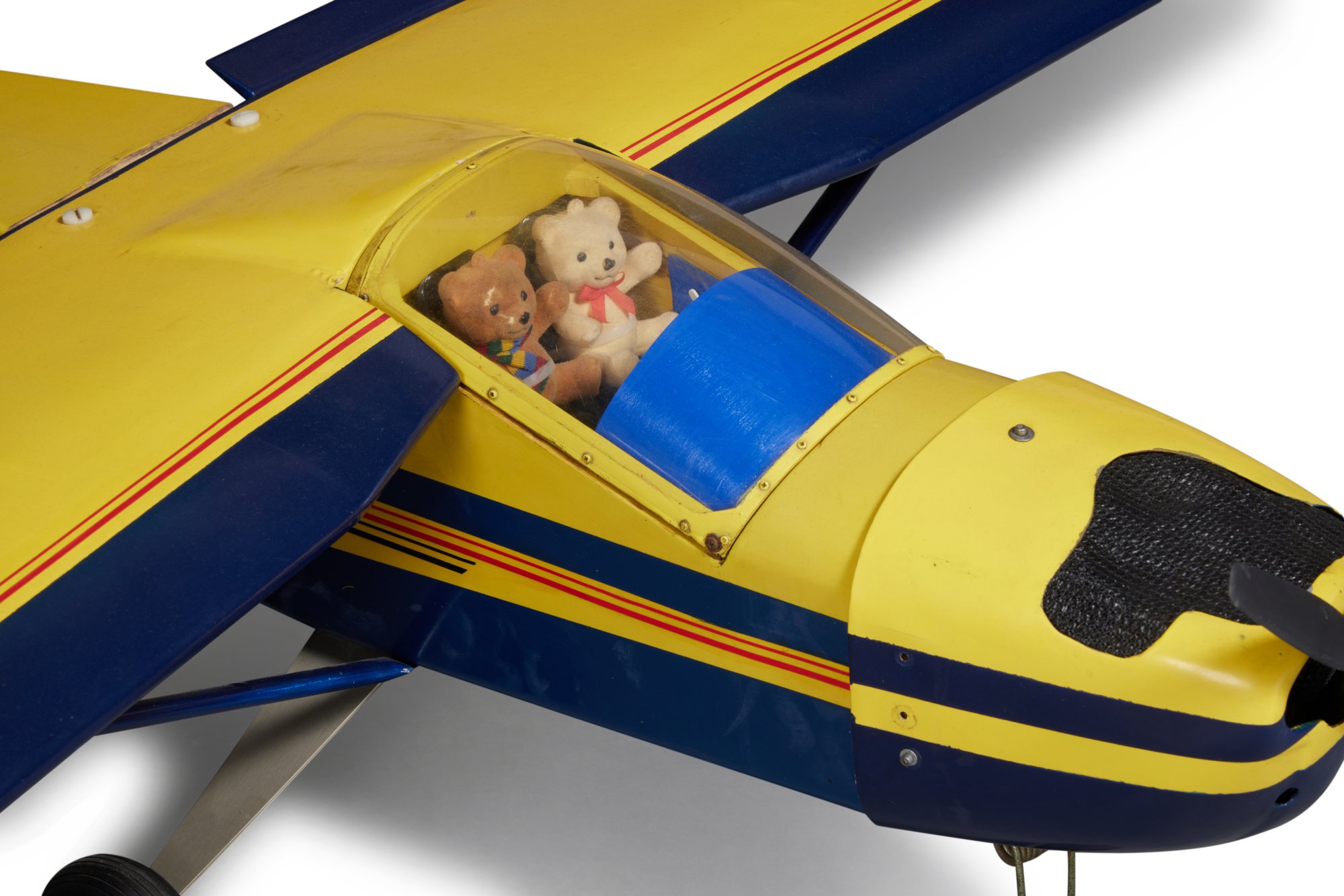 A Model of a Yellow and Blue Civilian Aircraft | Collecting Across ...