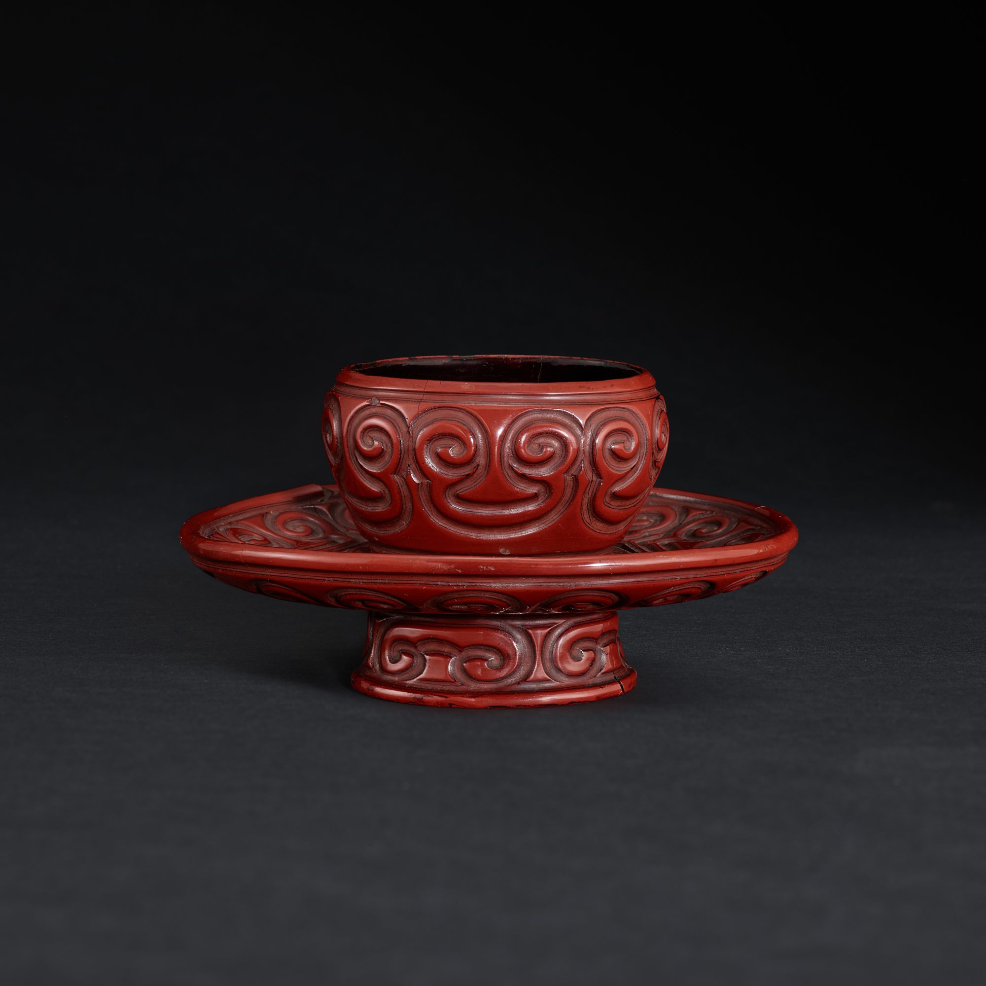 A cinnabar 'tixi' lacquer cup stand, Yuan dynasty 元 朱面剔犀盞托 | CHADŌ ...