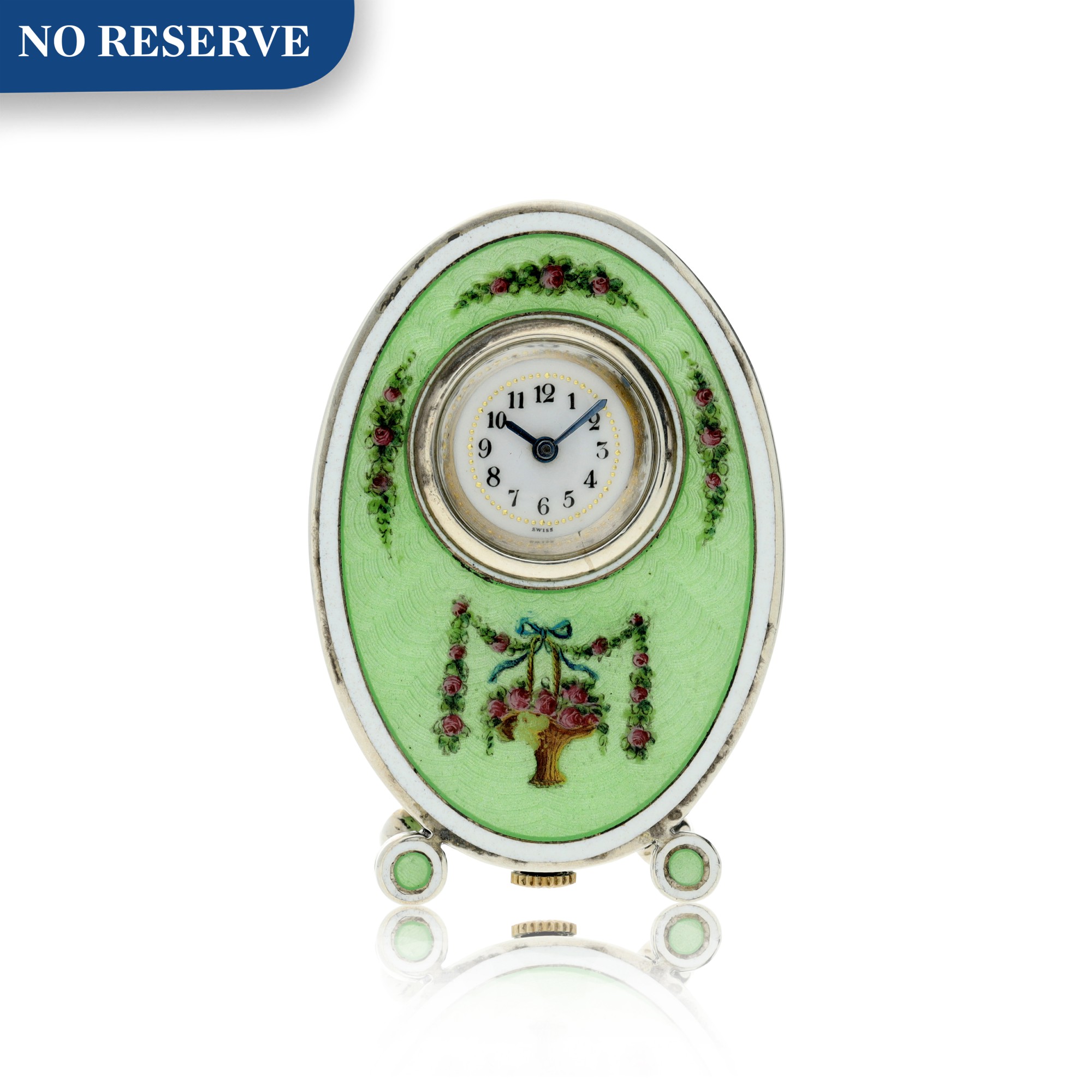 A sterling silver desk clock with green and white enamel, Circa 1930 ...