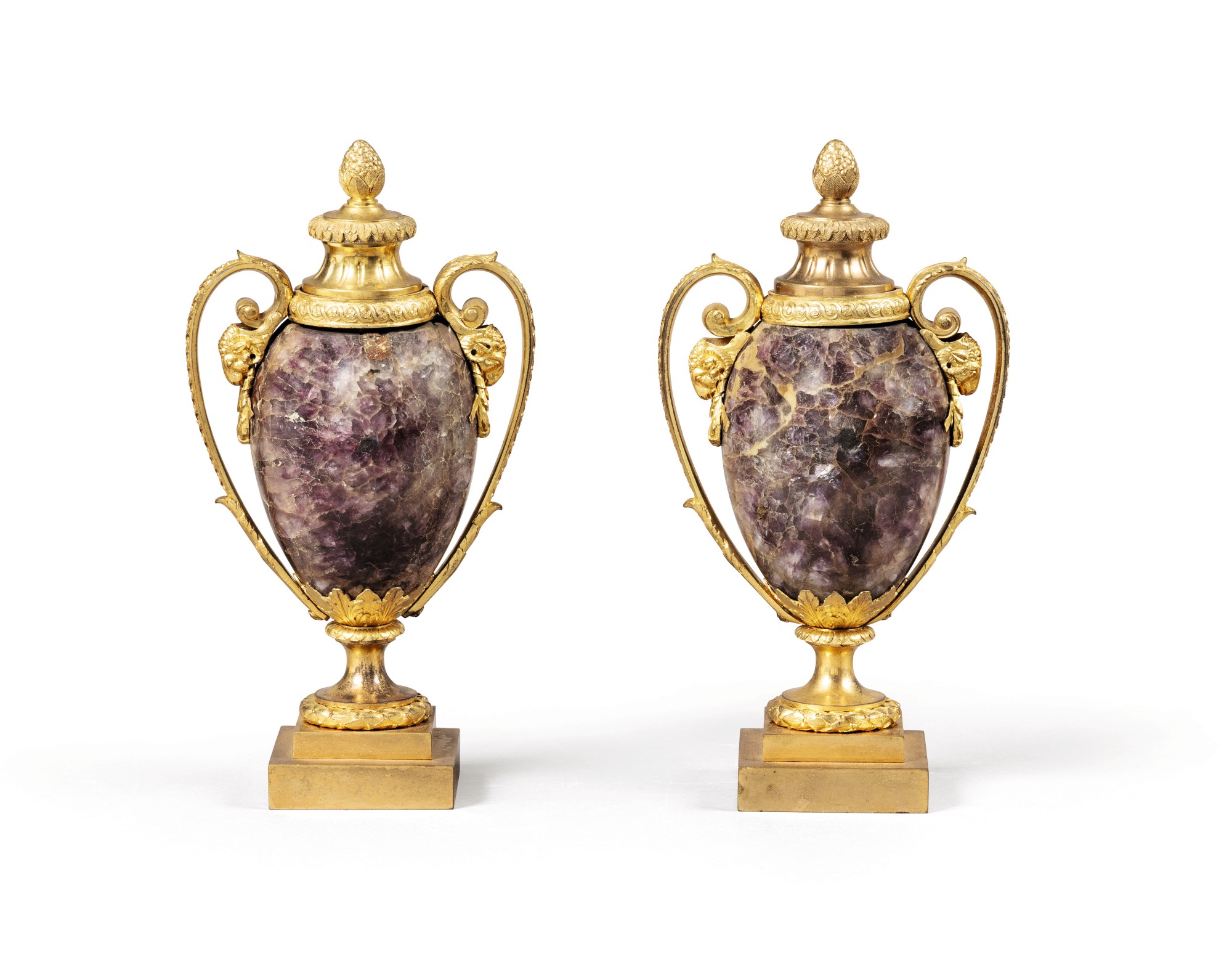 A pair of gilt-bronze-mounted blue-john candle-vases, in the manner of ...