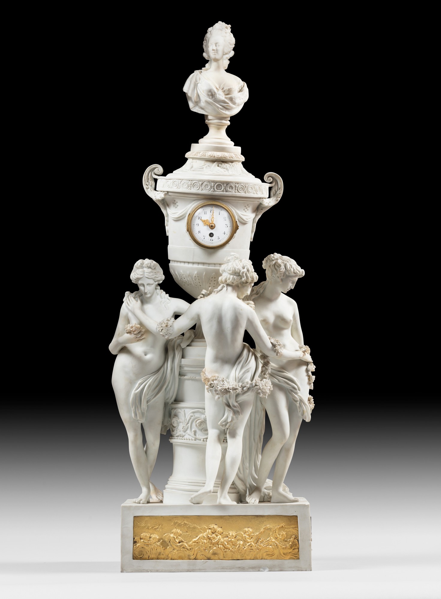 A gilt-bronze mounted and biscuit clock, late 19th century - early 20th ...