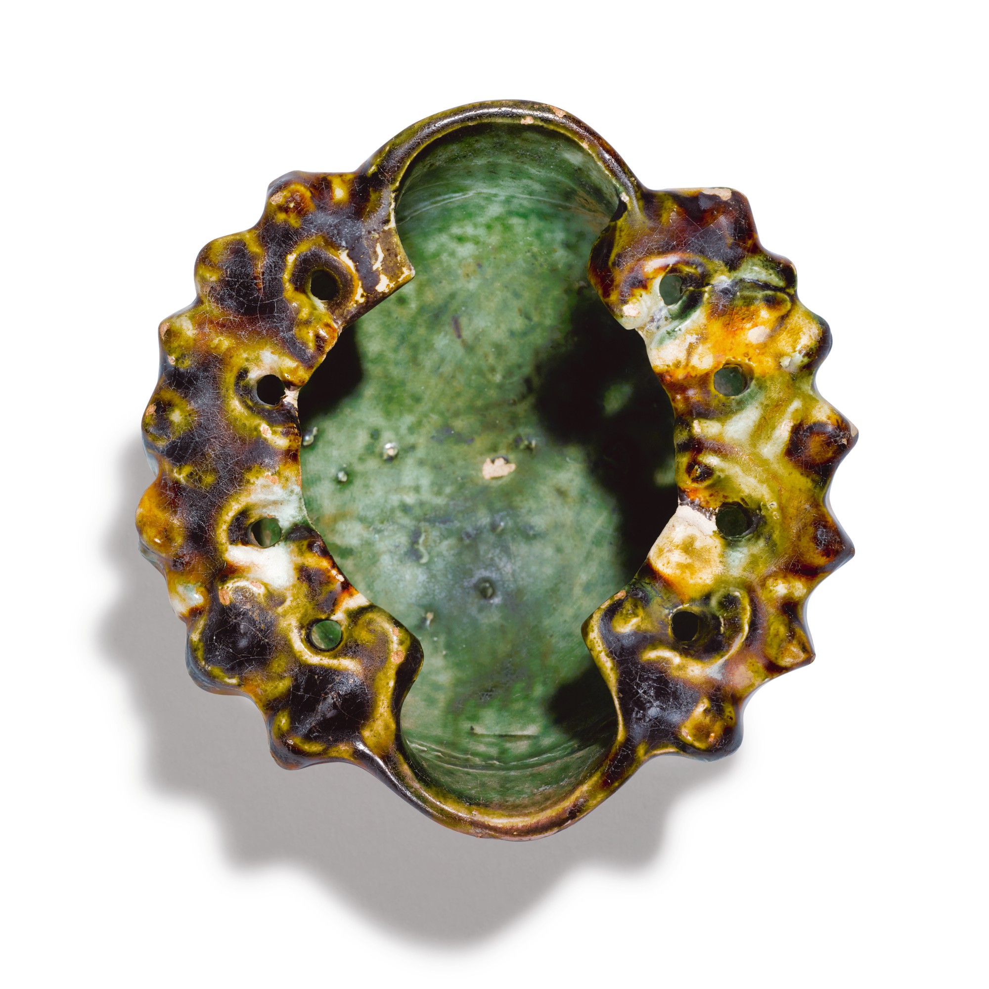 A molded sancai-glazed 'conch shell' pottery cup, Tang dynasty | 唐 ...