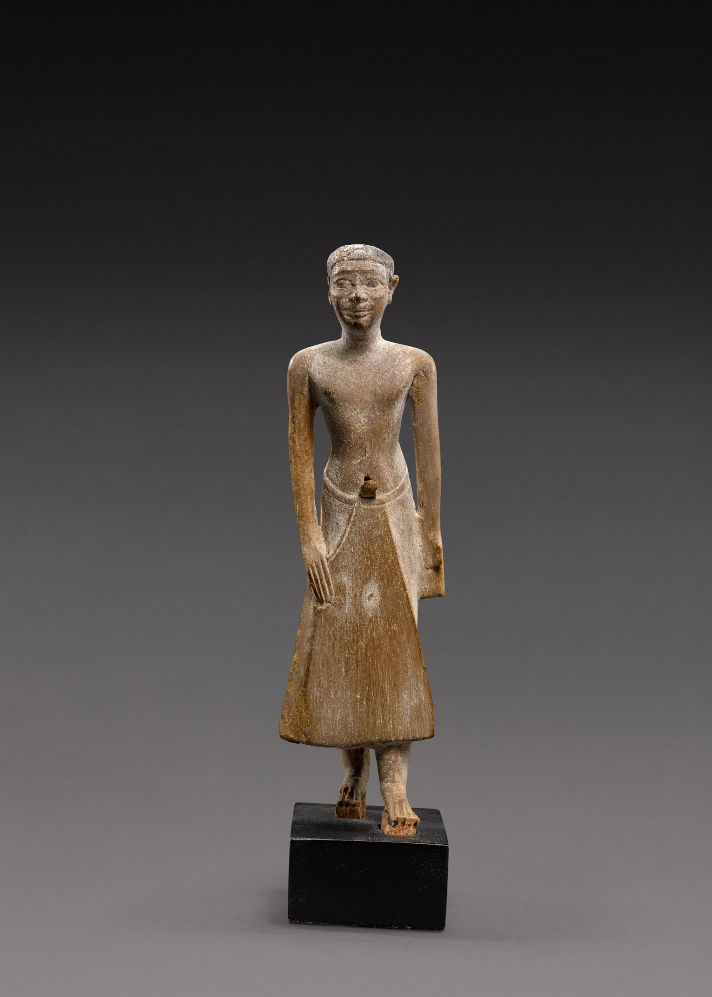 An Egyptian Wood Figure of a Man, 6th Dynasty, reign of Pepi II, circa ...