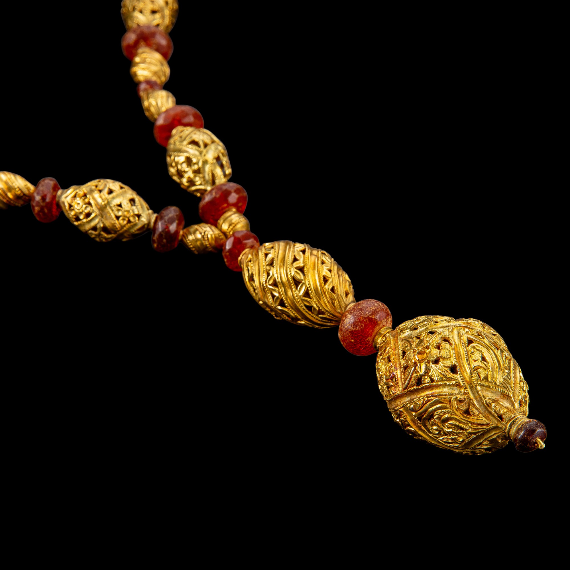A necklace with gold and facetted amber beads Pyu, 9th - 11th century ...