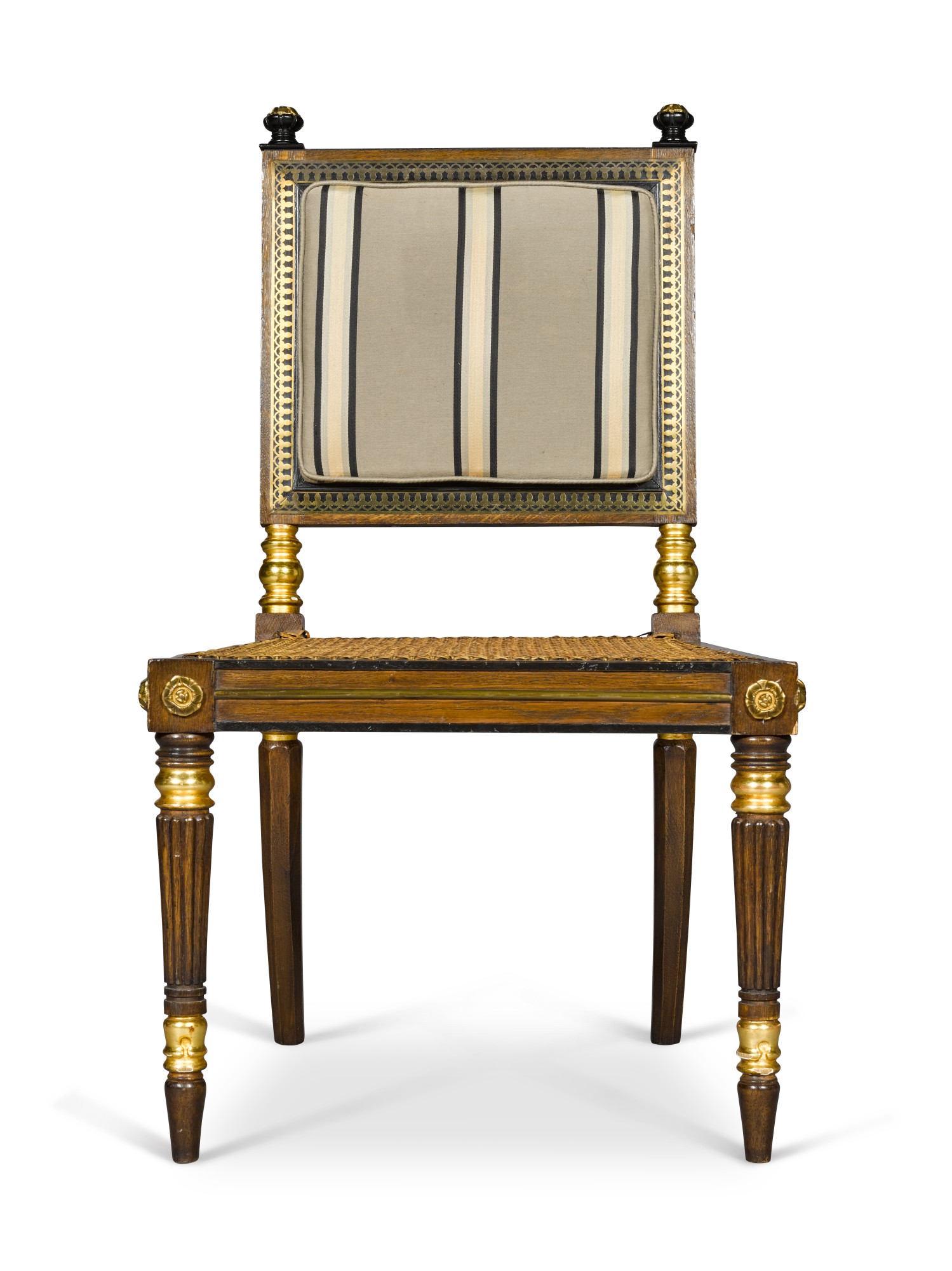 A pair of Regency ormolu-mounted brass-inlaid ebony and oak side chairs ...