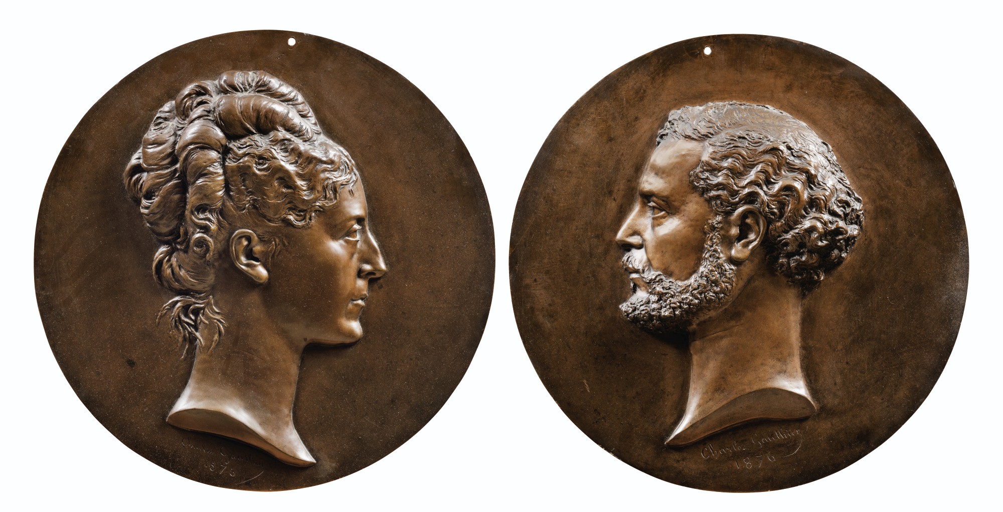 CHARLES GAUTHIER | A PAIR OF MEDALLIONS WITH THE PROFILES OF A MAN AND ...