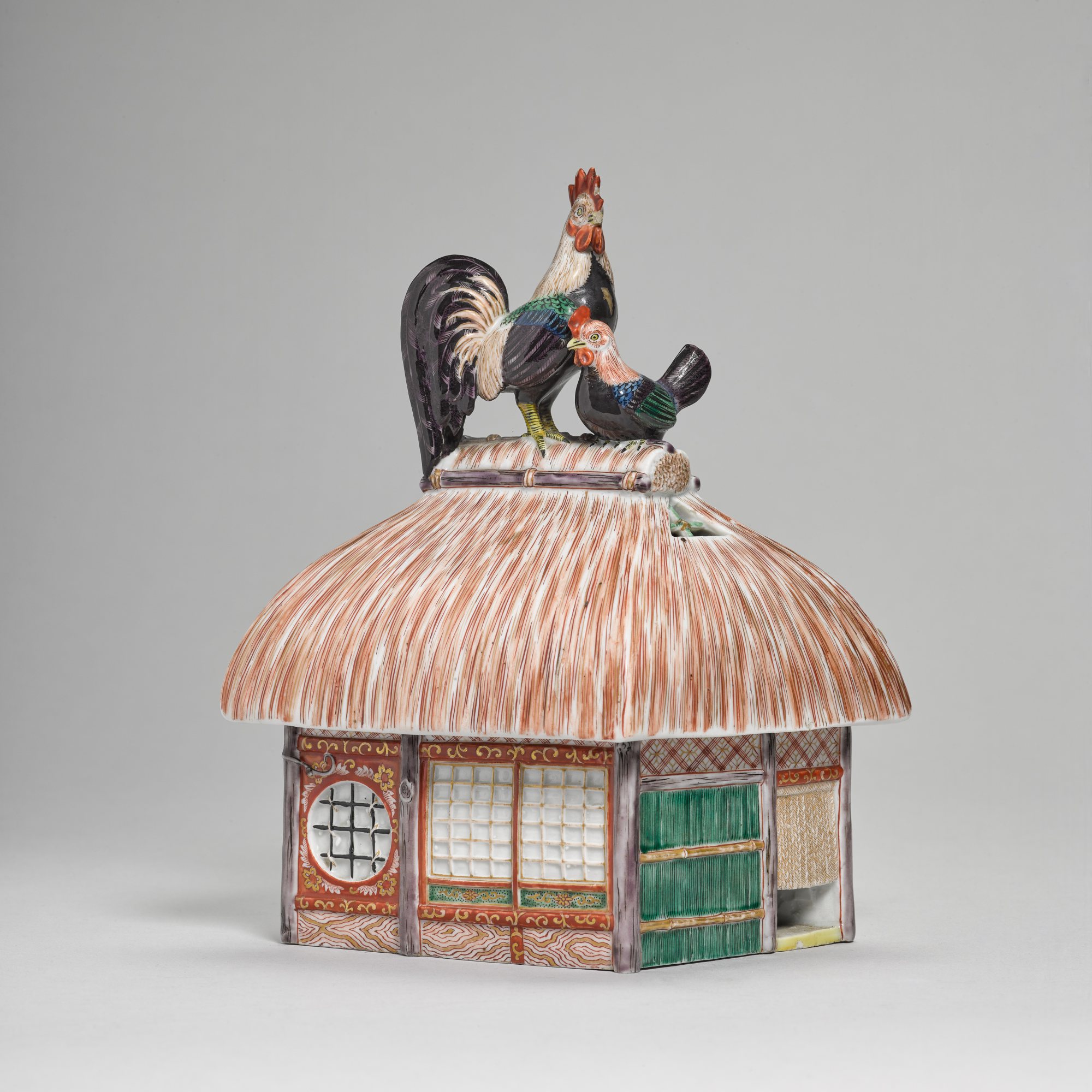 A Kenjo Imari koro [incense burner] modeled as a cockerel and hen on a ...