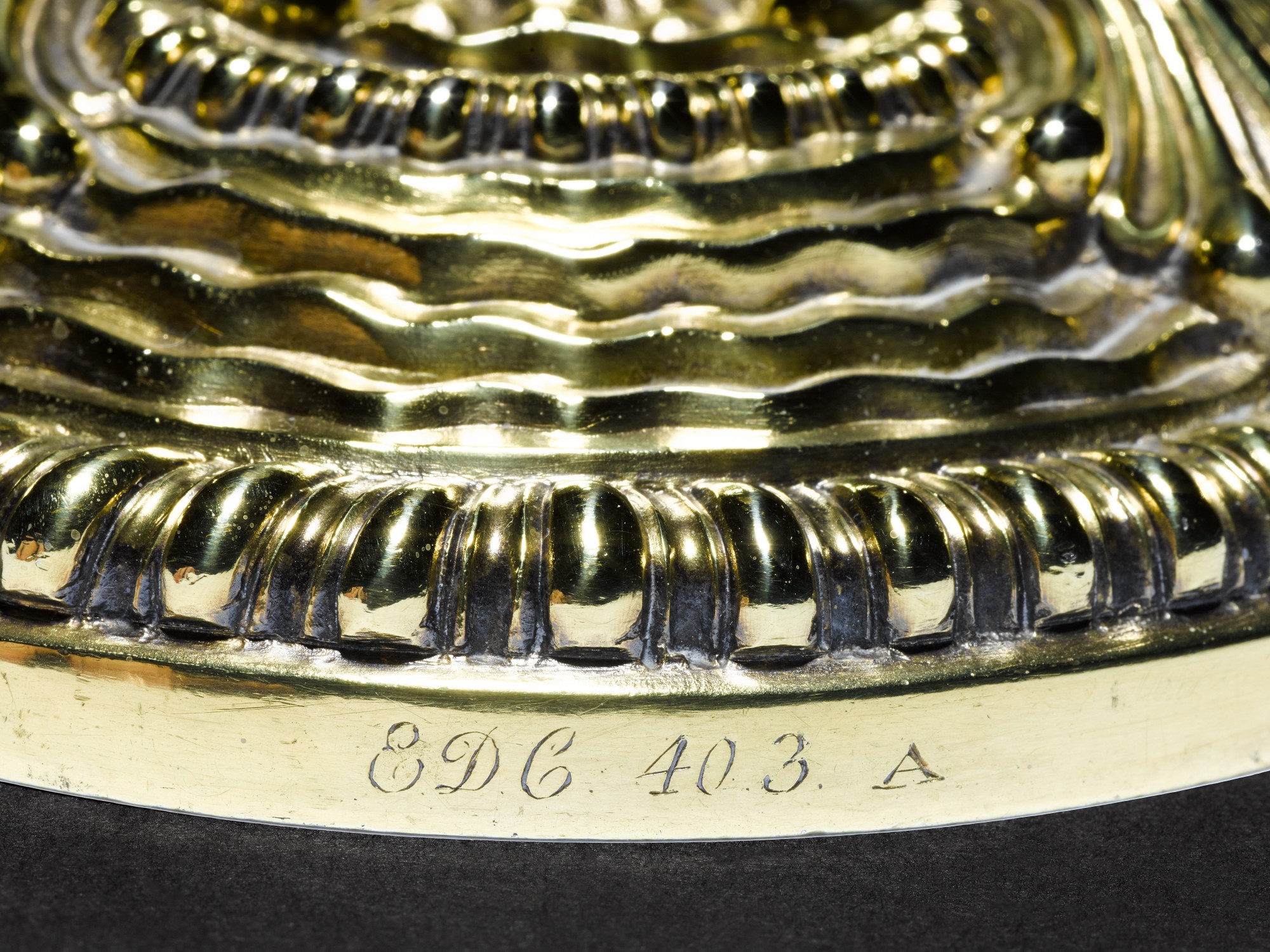 Royal: A set of twelve silver-gilt candlesticks, two William Solomon ...