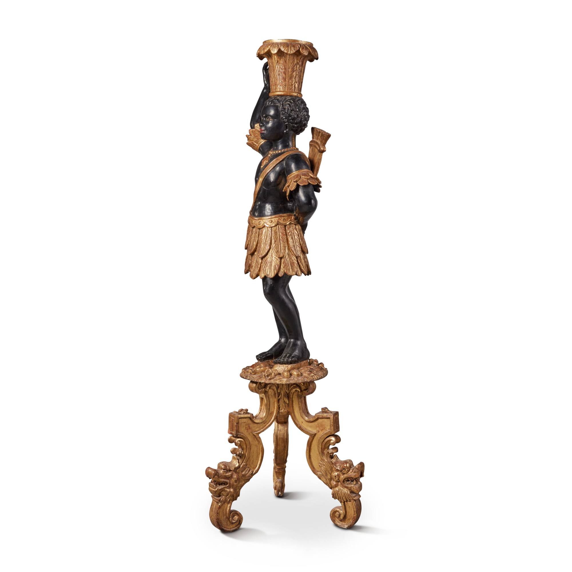 An Italian Baroque Style Parcel Gilt Figural Torchère, Late 19th/Early ...