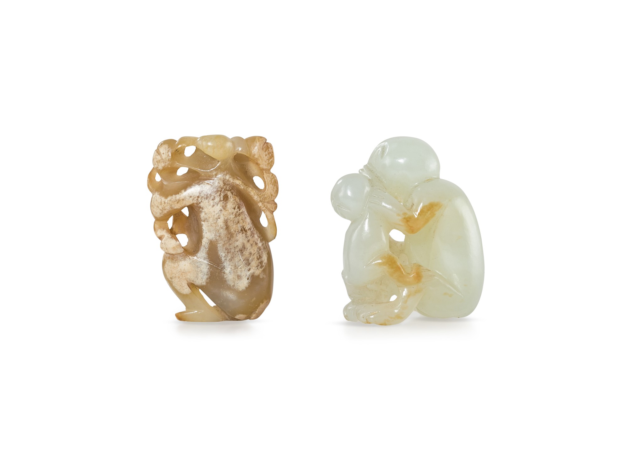 A jade figure of a monkey, Ming dynasty, and a white jade 'monkey ...