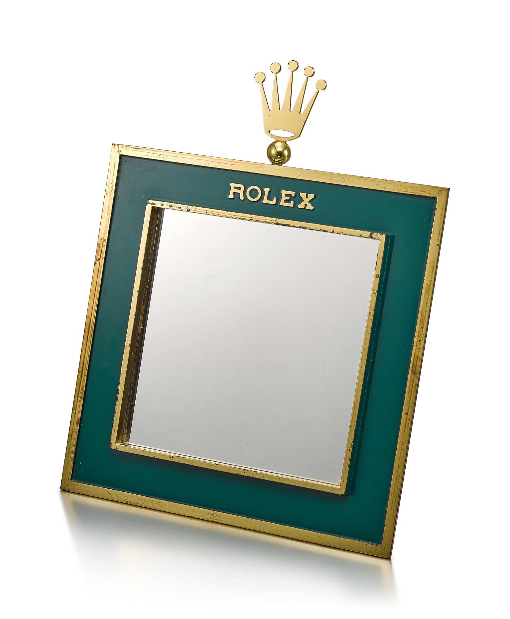 ROLEX | A GILT BRASS AND GREEN ENAMEL RETAILER'S DISPLAY MIRROR WITH ...