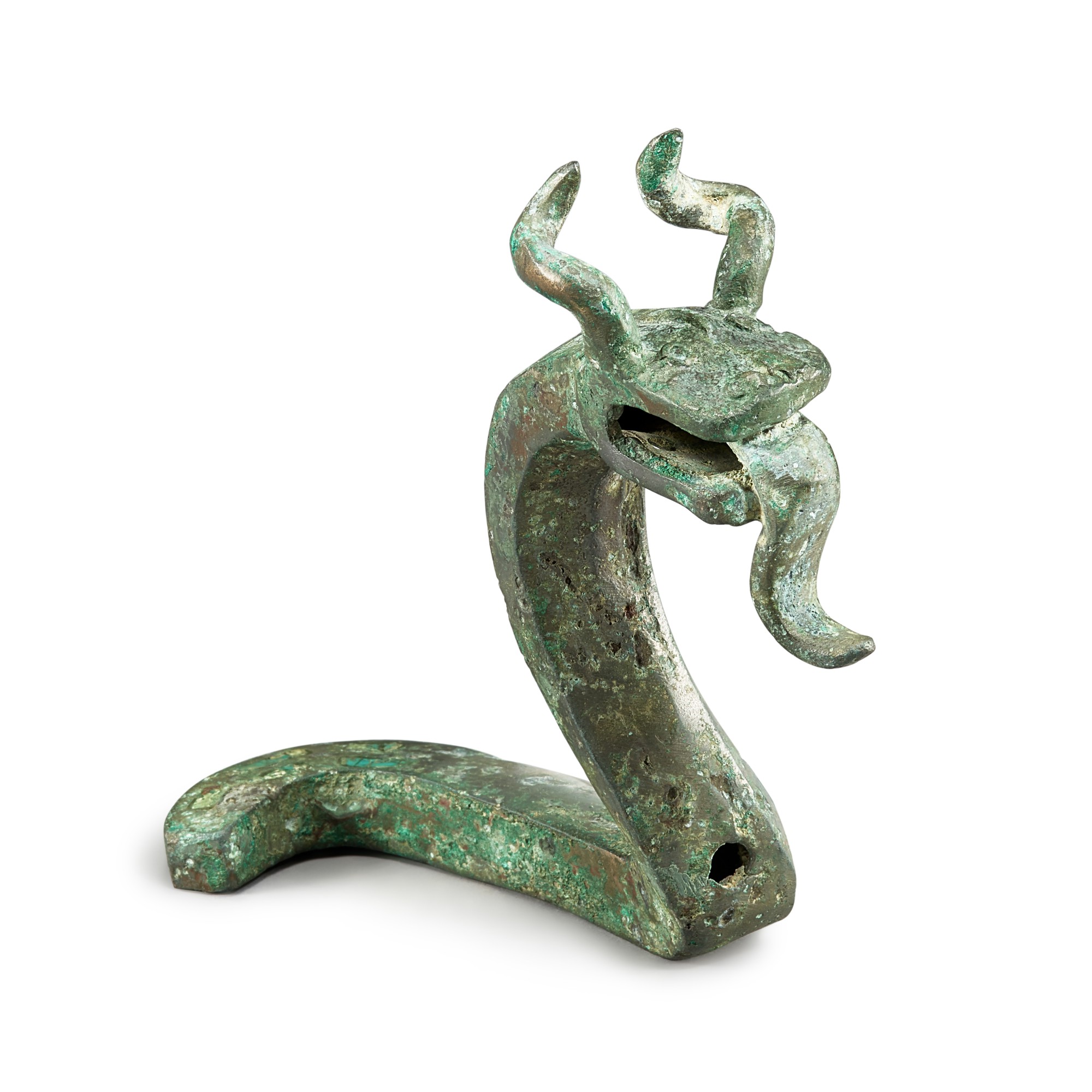 A turquoise-inlaid archaic bronze 'dragon' chariot fitting Spring and ...