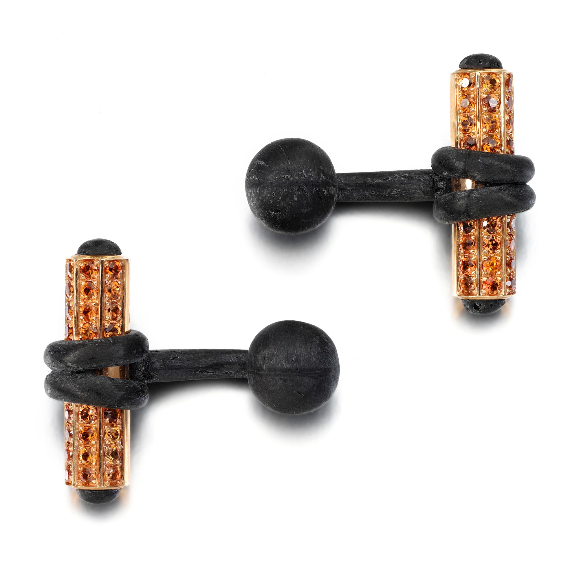 Pair of pink gold, carbon fibre and orange sapphire cufflinks, 'Cappio ...