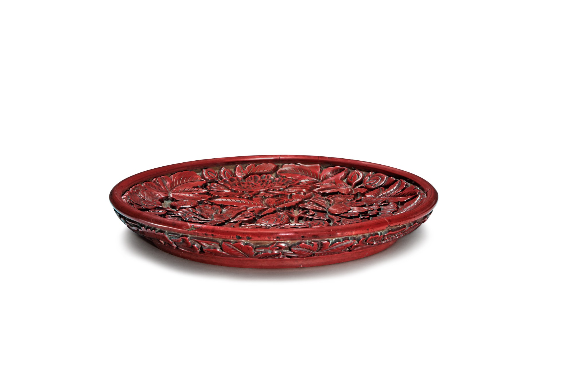 A magnificent carved cinnabar lacquer 'hibiscus' dish, Yuan / Early ...