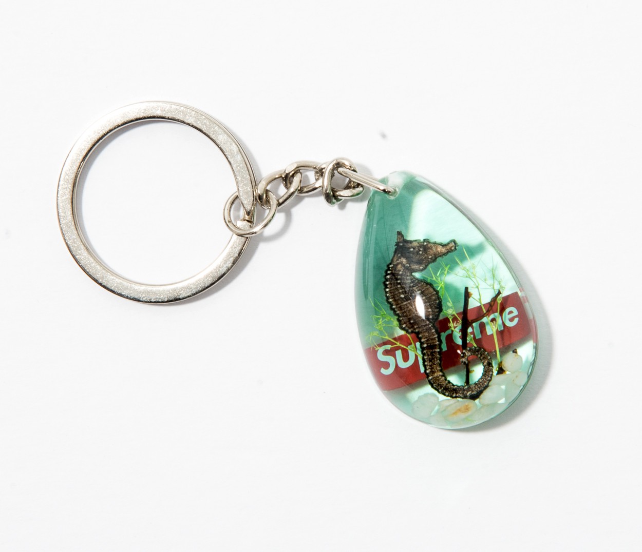 A GROUP OF 11 PLASTIC SUPREME KEYCHAINS | The Supreme Vault: 1998 ...
