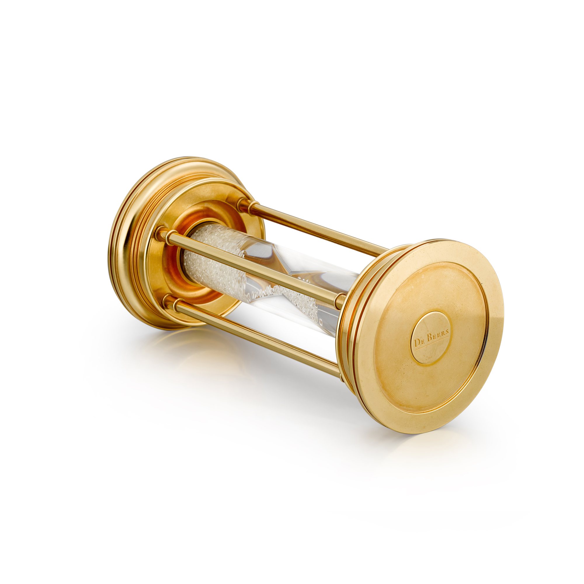 A gilt brass hourglass with floating diamonds, Circa 2000 | 鍍金銅製沙漏 ...