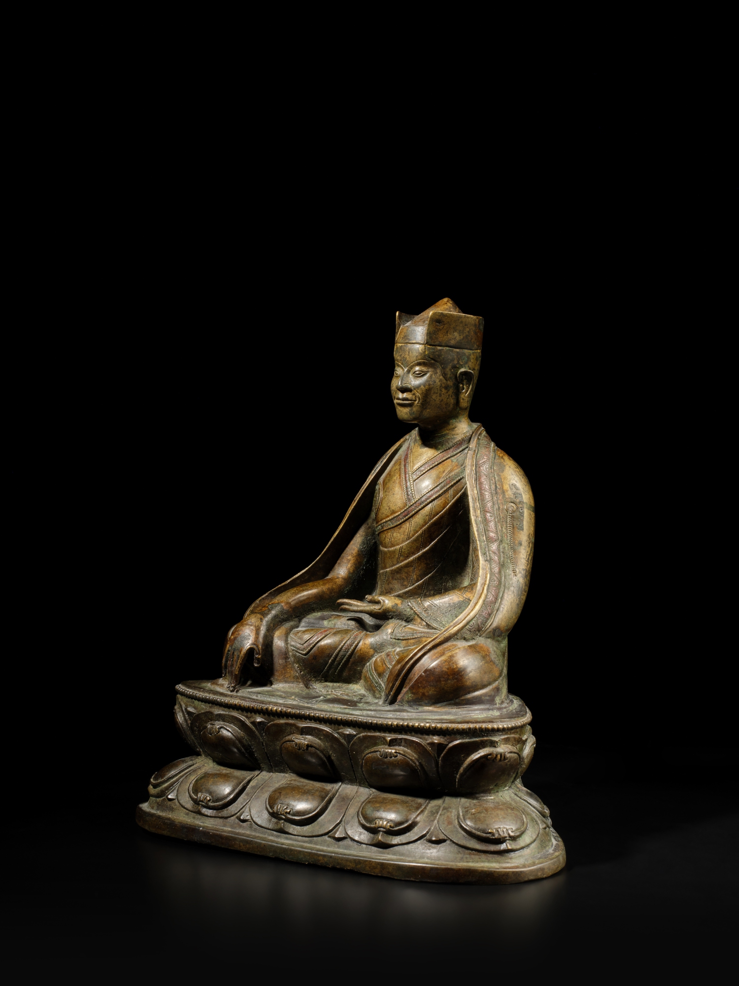 A large copper and silver-inlaid copper alloy figure of the First ...