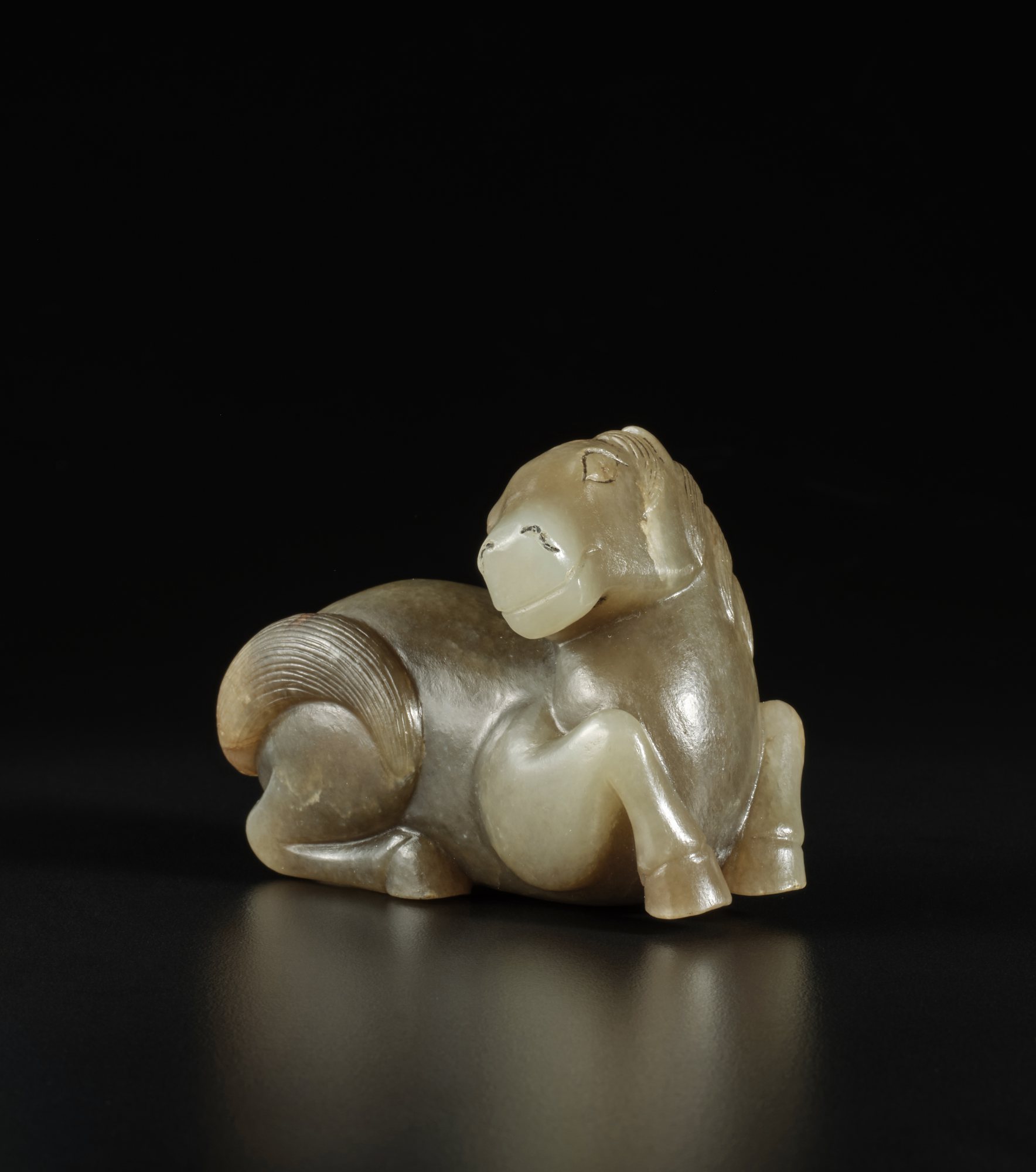 A celadon and brown jade carving of a horse, Song - Ming dynasty | 宋至明 ...
