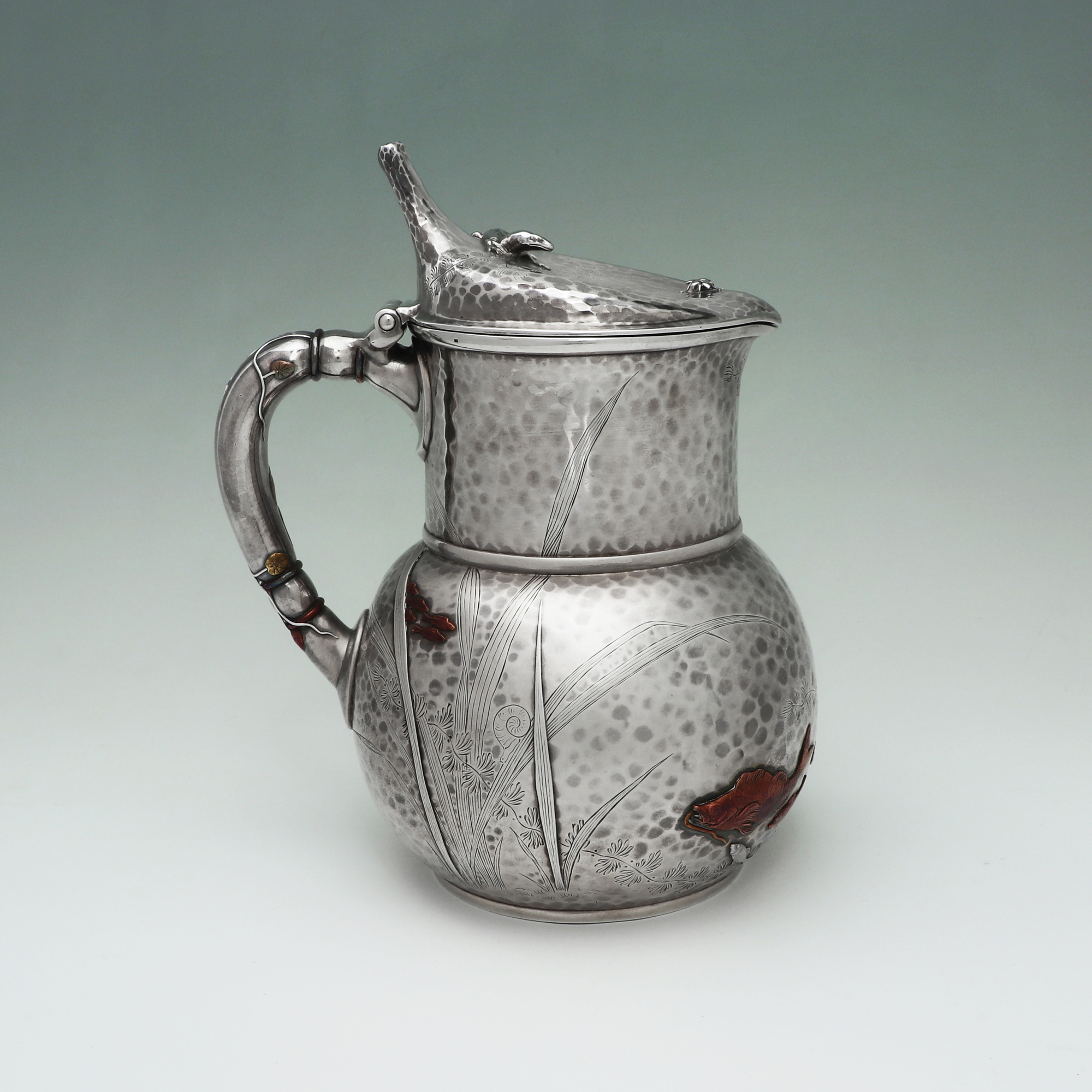 AN AMERICAN SILVER AND MIXED-METAL BEER JUG | TIFFANY & CO., NEW YORK ...