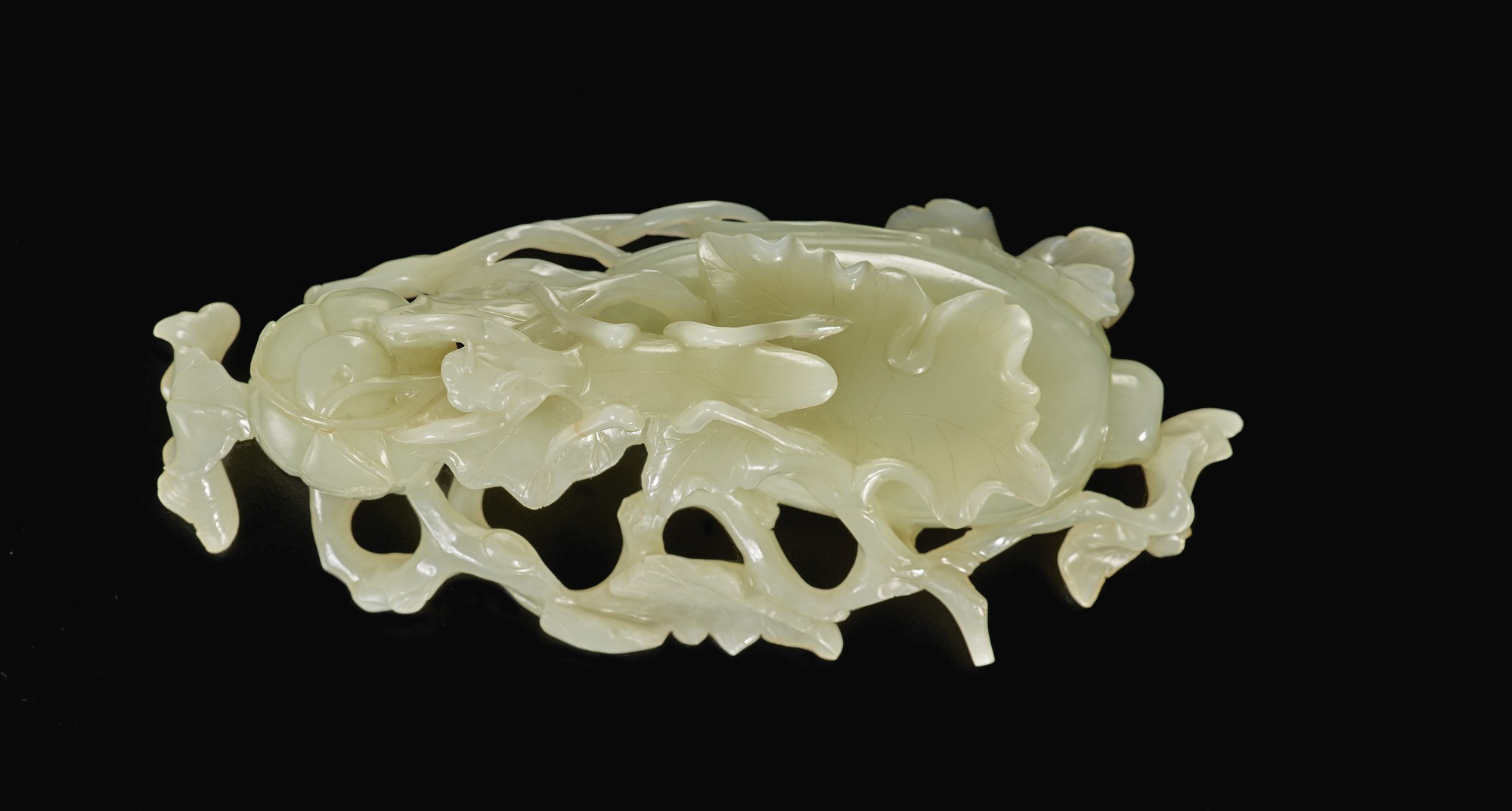 A pale green jade 'praying mantis' double box and cover, Qing dynasty ...