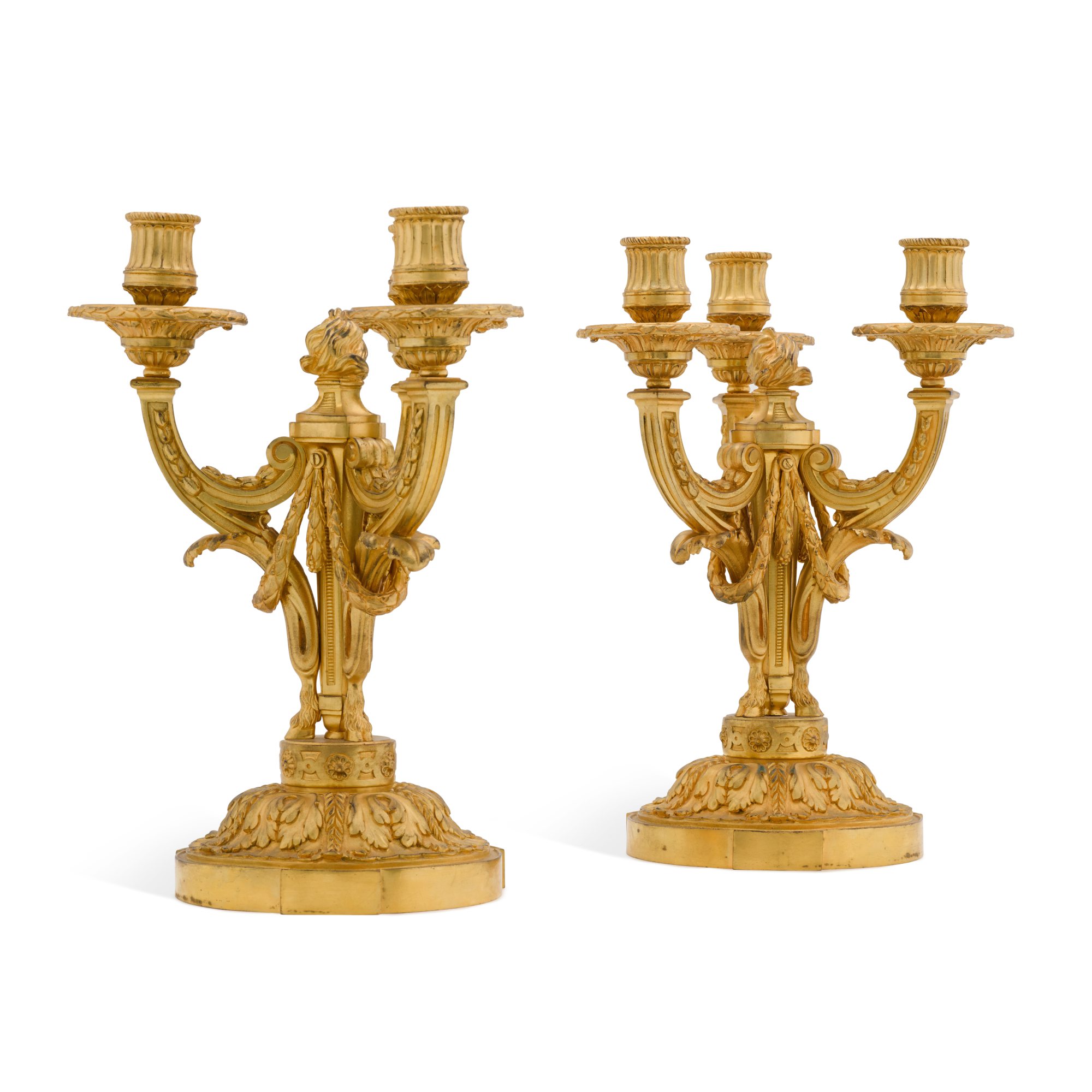 A pair of Louis XVI style three-light candelabra by Eugene Hazart ...