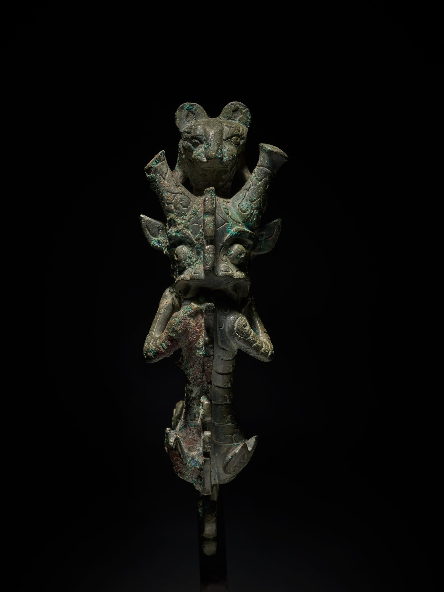 An exceptional and rare archaic bronze 'mythical beast' handle, Late ...
