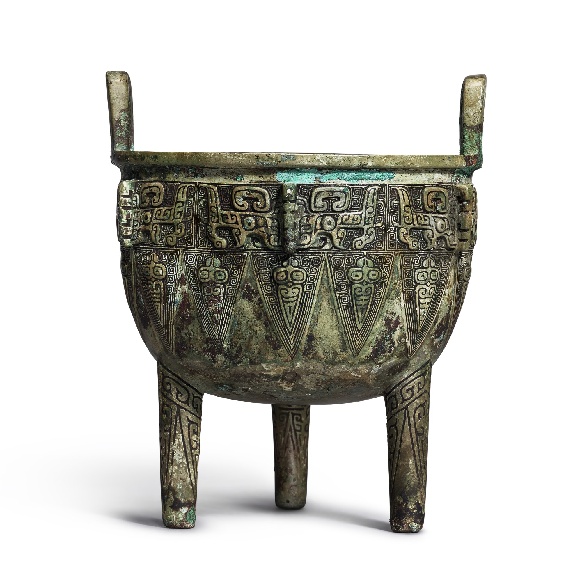 A superb inscribed archaic bronze 'animal mask' food vessel (ding ...