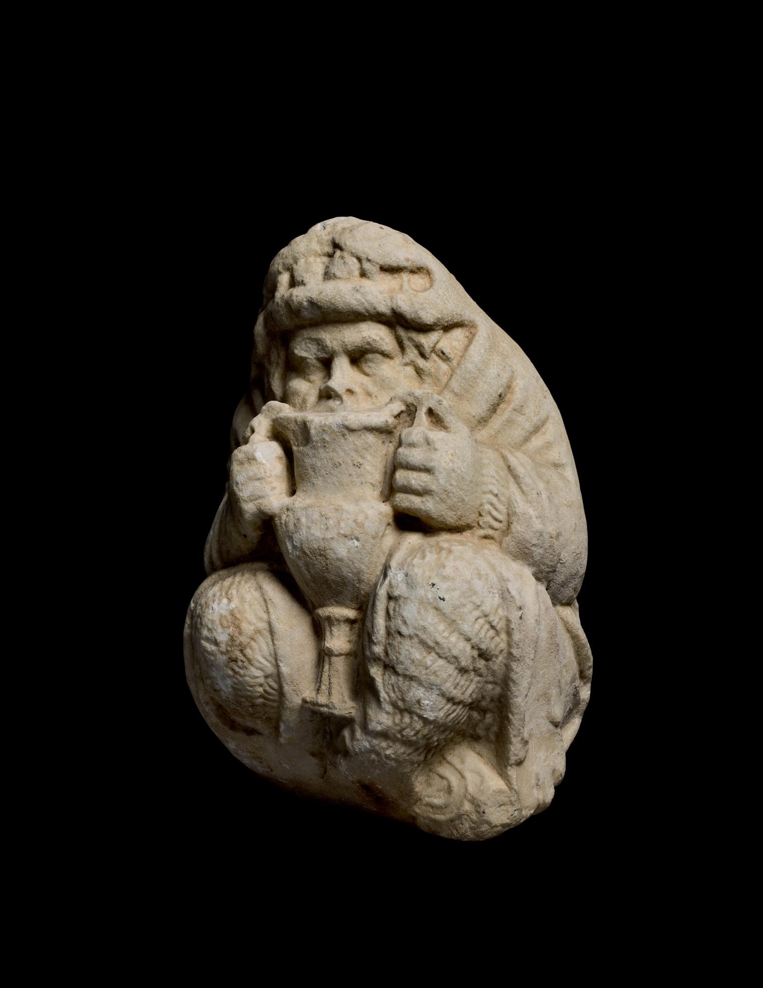 A ROMAN MARBLE CROUCHING FIGURE OF SILENUS, CIRCA 2ND CENTURY A.D ...