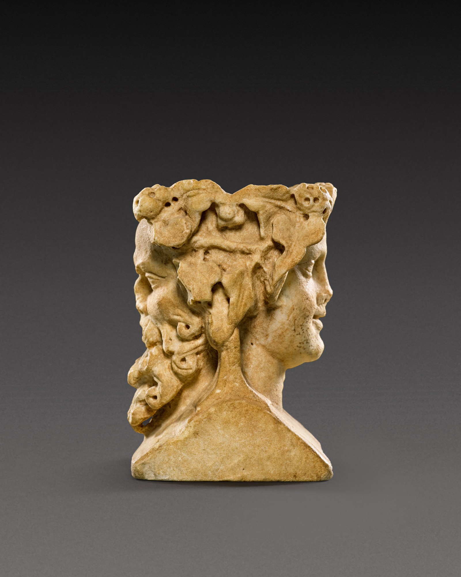 A Roman Marble Janiform Herm Bust of Silenus and a Satyr, circa 2nd ...