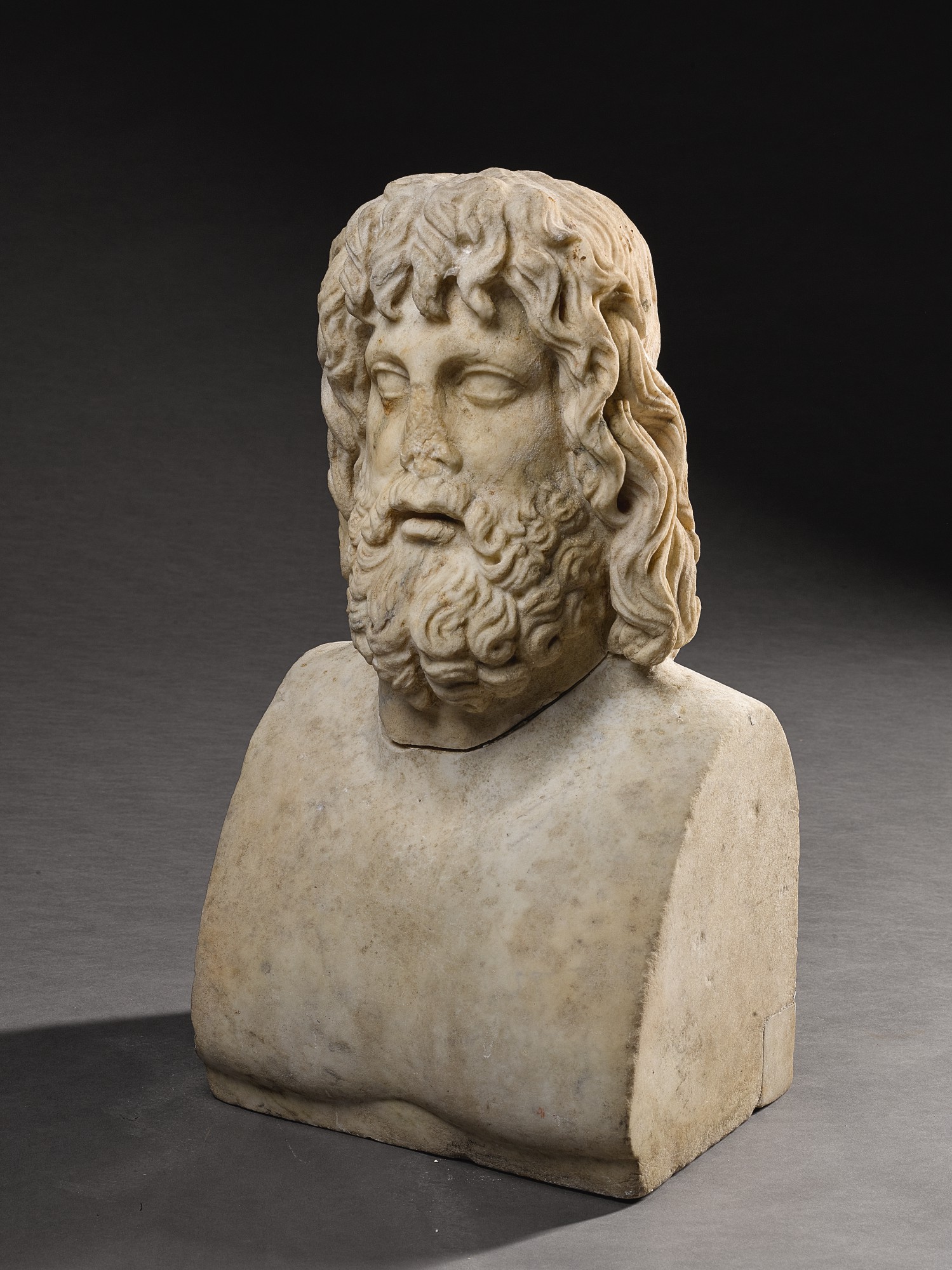 A ROMAN MARBLE HEAD OF SARAPIS, CIRCA 2ND CENTURY A.D., ON 19TH CENTURY ...