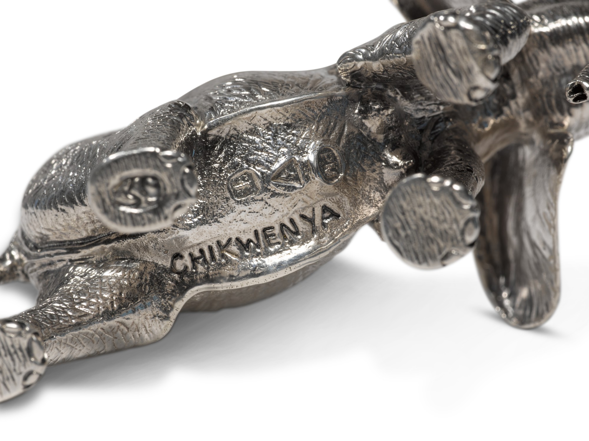 A Zimbabwean Silver Acacia Tree Two-Light Candelabrum and Nine ...