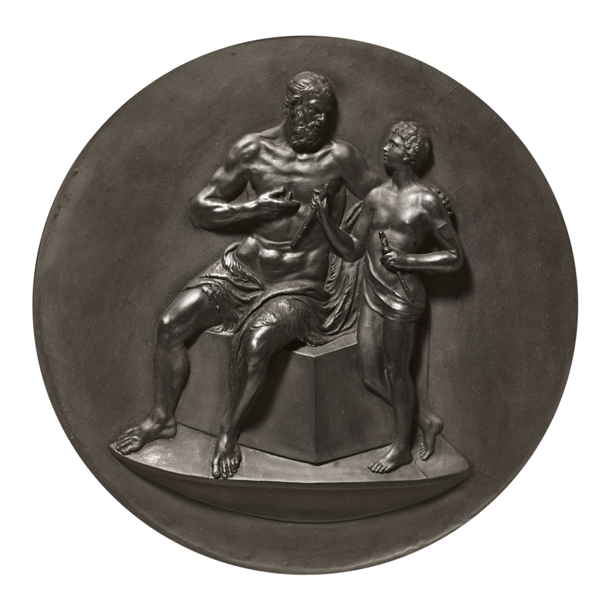 A WEDGWOOD BLACK BASALT CIRCULAR PLAQUE OF MARSYAS AND THE YOUNG ...