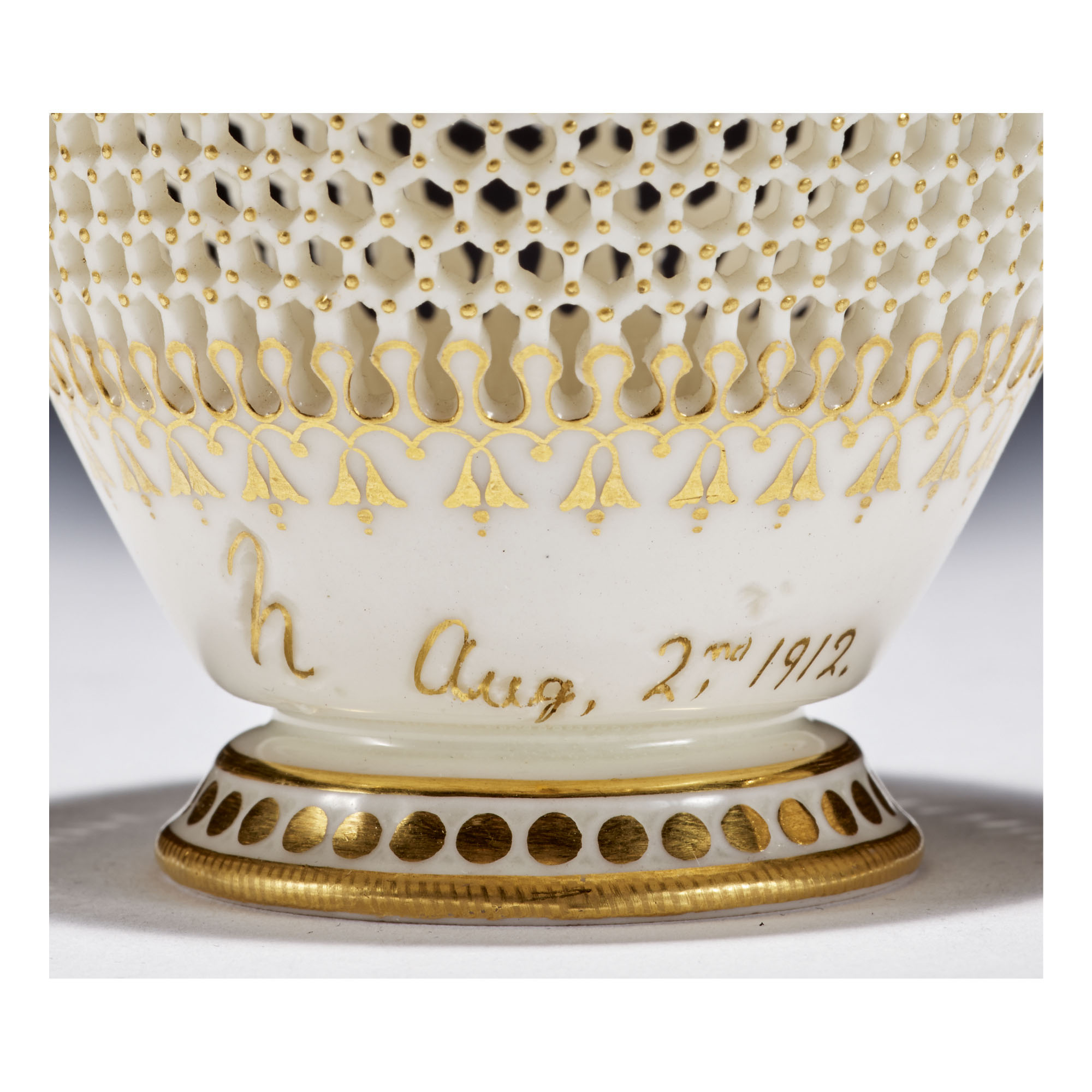 A ROYAL WORCESTER RETICULATED PORCELAIN TWO-HANDLED VASE BY GEORGE OWEN ...