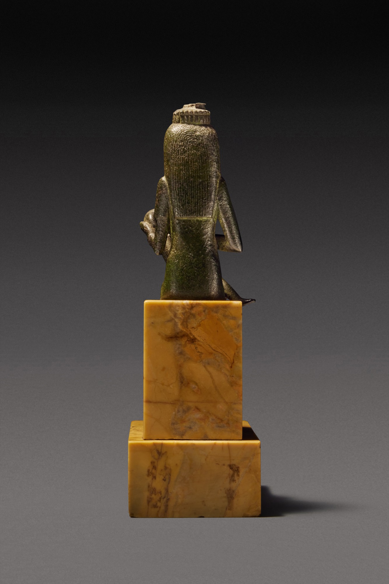 An Egyptian Bronze Figure of Isis with Horus, 26th Dynasty, 664-525 B.C ...