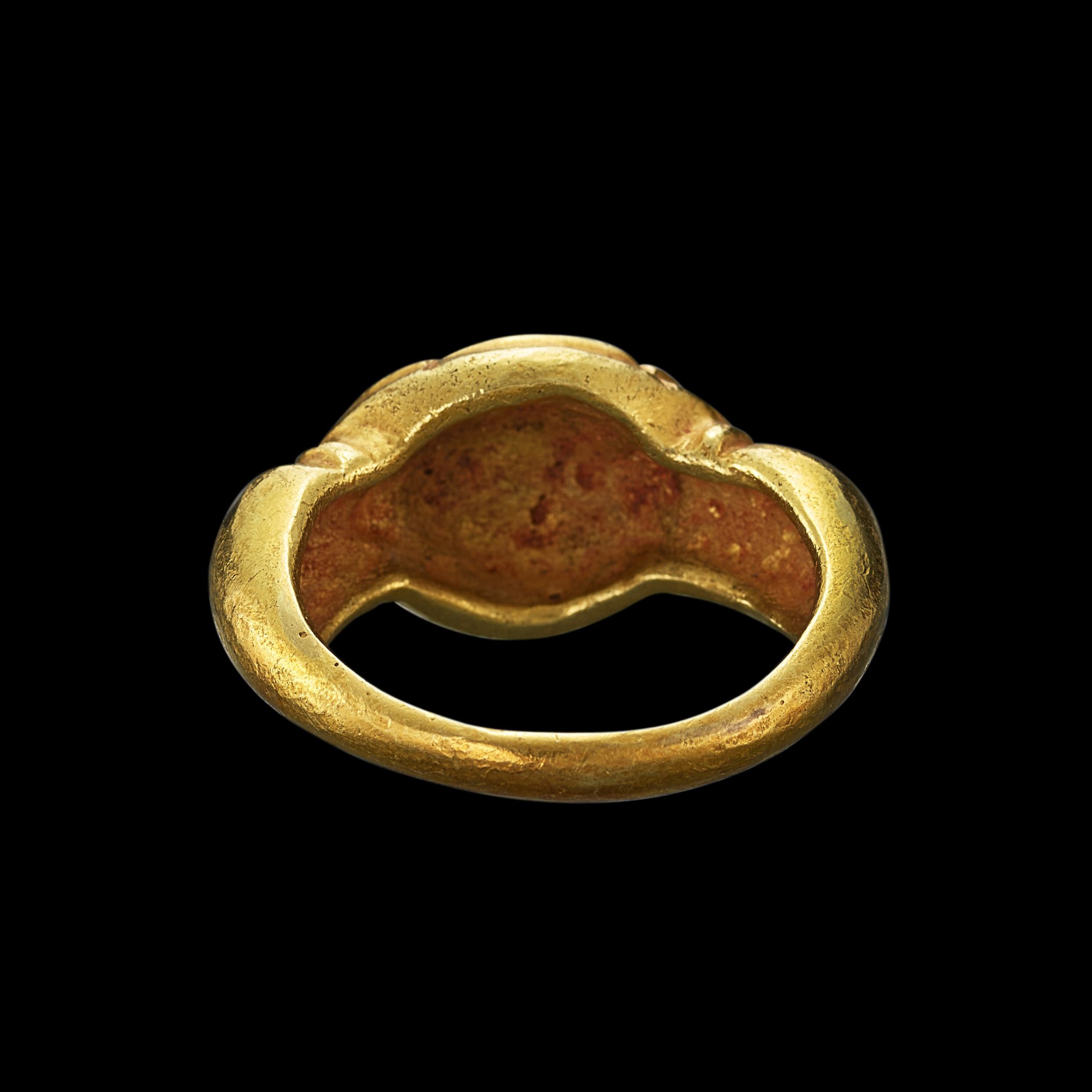 A solid gold ring with an incised bezel Java, Indonesia, 7th-12th ...