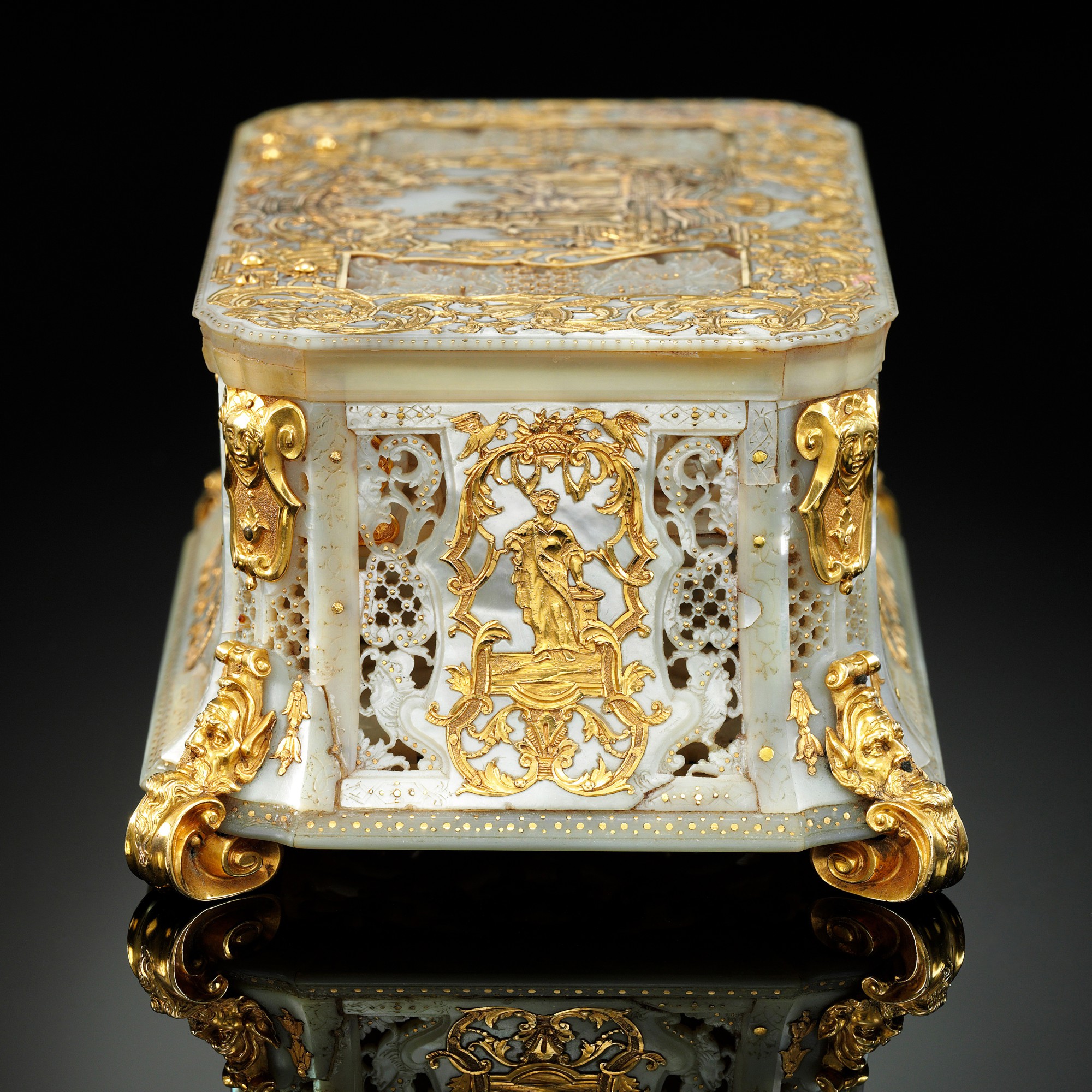 A mother of pearl casket with gold appliqué, mounts and piqué point ...
