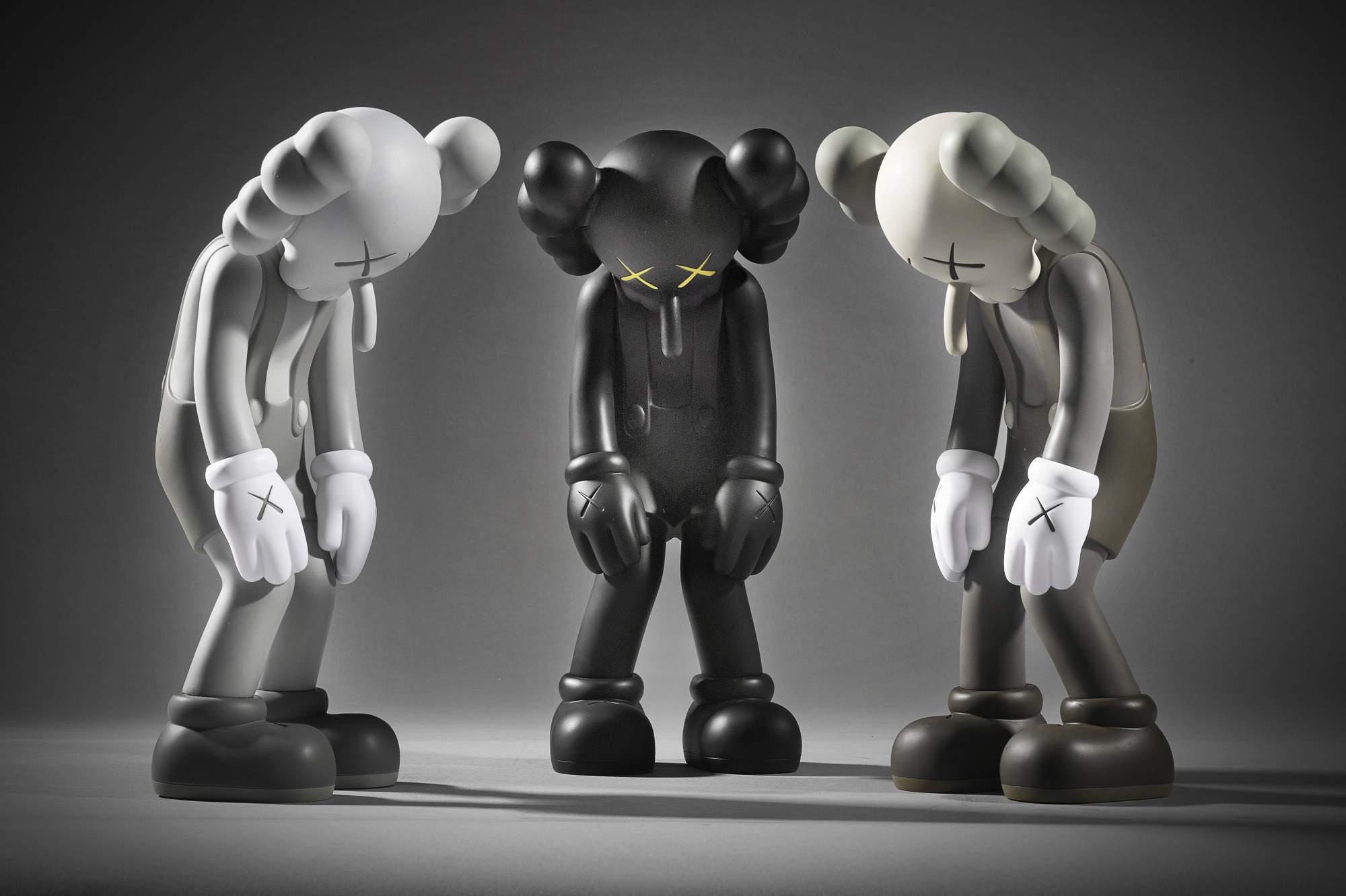 KAWS | THREE WORKS: (I) SMALL LIE (BROWN); (II) SMALL LIE (BLACK); (III ...